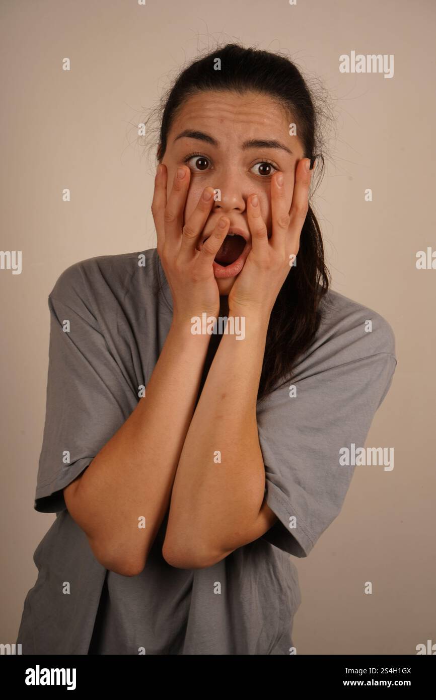 The interesting facial expression conveys a moment of surprise. The ...