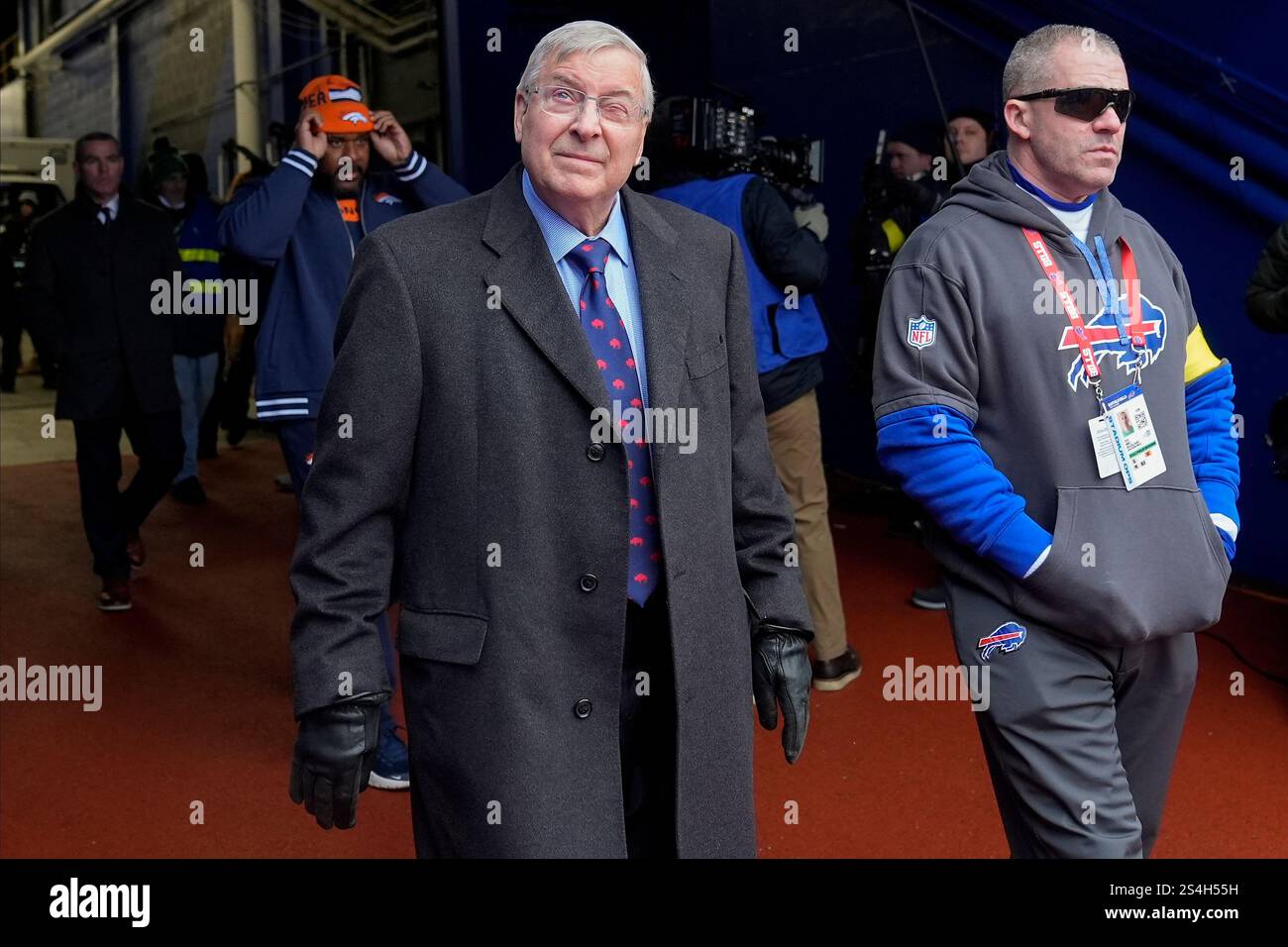 Buffalo Bills owner Terry Pegula walks onto the field before an NFL ...