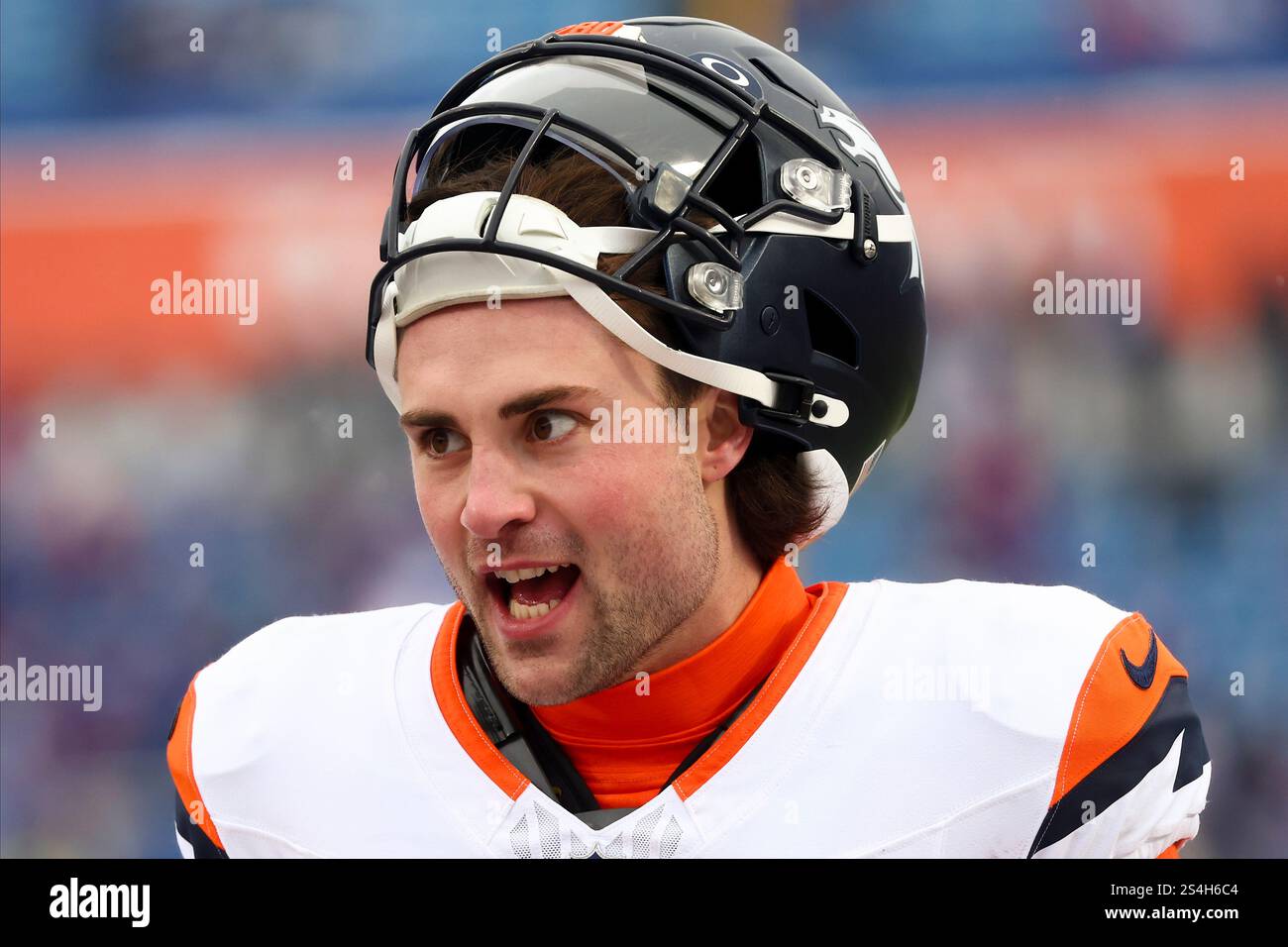 Denver Broncos cornerback Riley Moss (21) warms up before playing ...