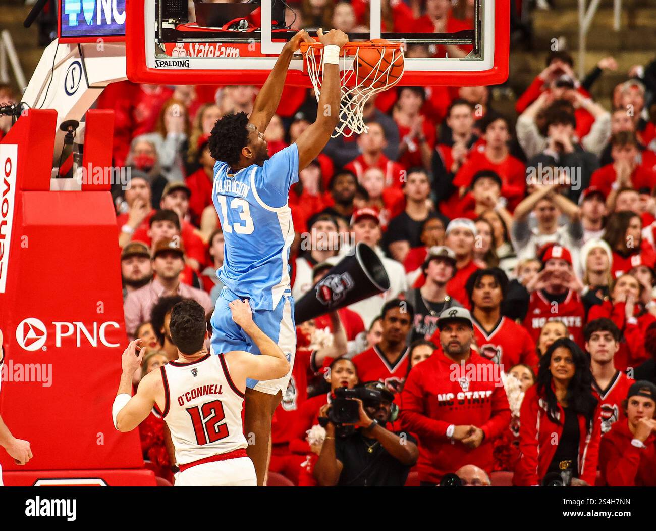 January 12, 2025: North Carolina junior Jalen Washington (13) makes winning dunk to win the game ...