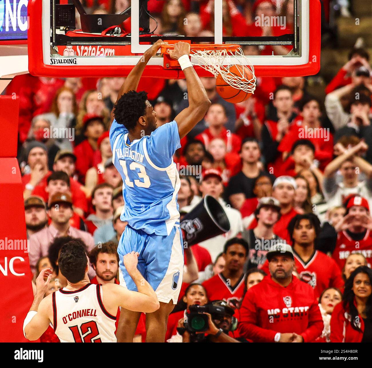 January 12, 2025: North Carolina junior Jalen Washington (13) makes winning dunk to win the game ...