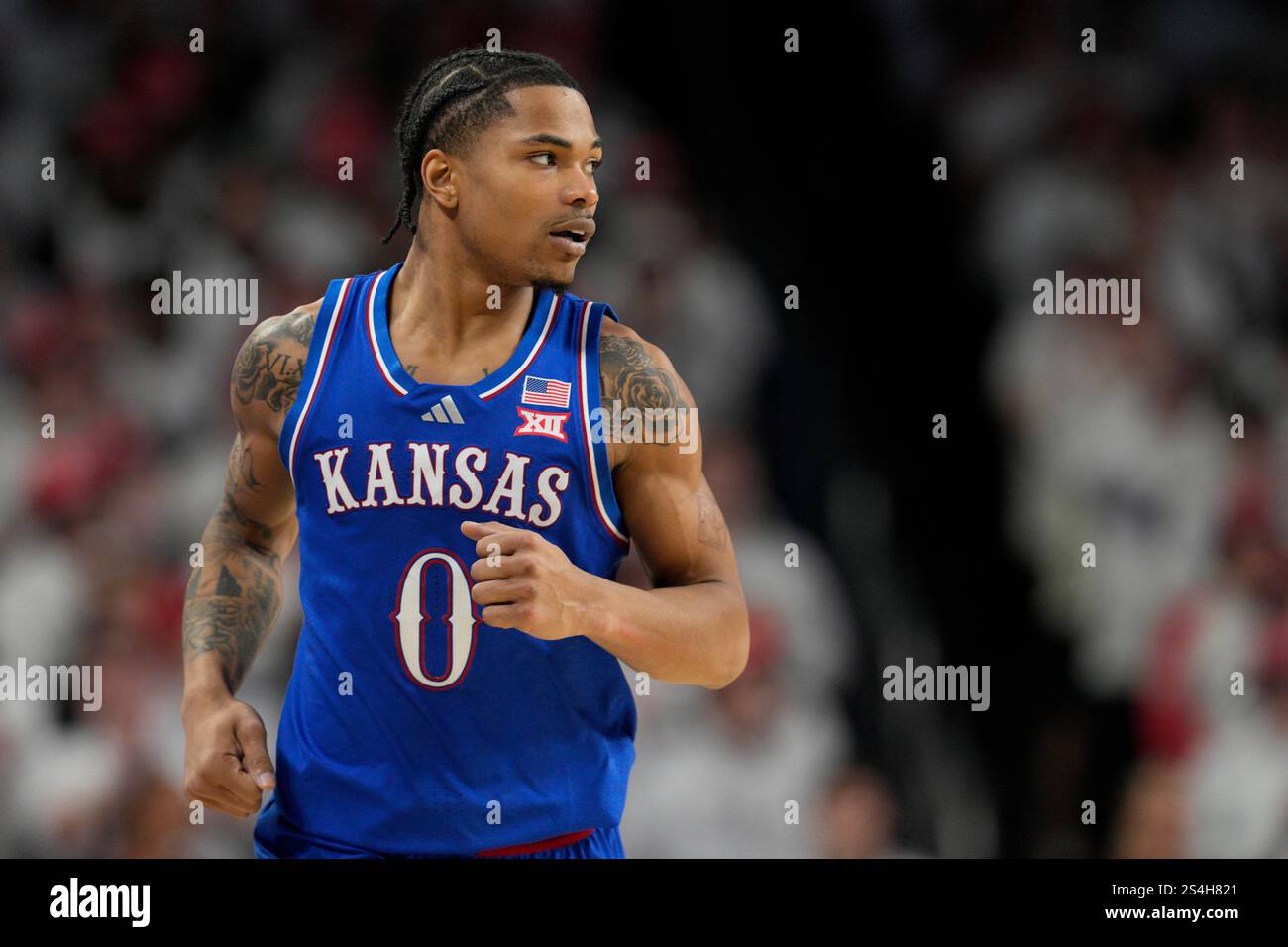Kansas guard Shakeel Moore (0) plays during an NCAA college basketball ...