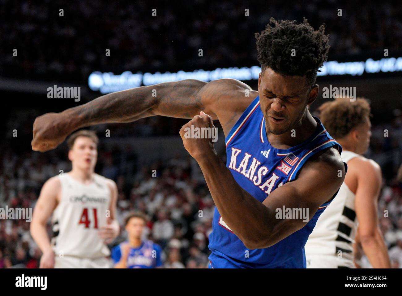 Kansas forward KJ Adams Jr. (24) reacts after scoring during the second ...