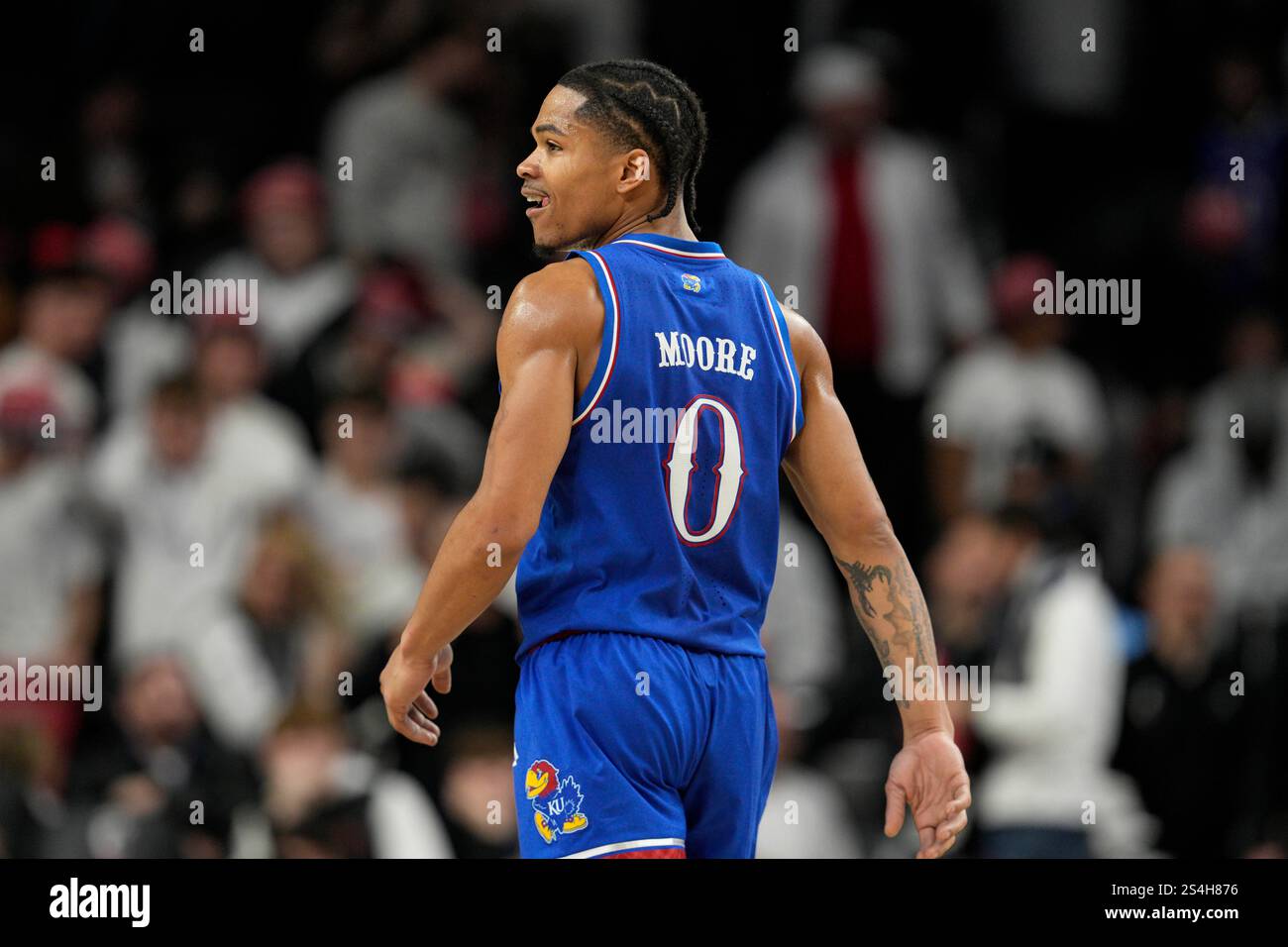 Kansas guard Shakeel Moore (0) plays during an NCAA college basketball ...