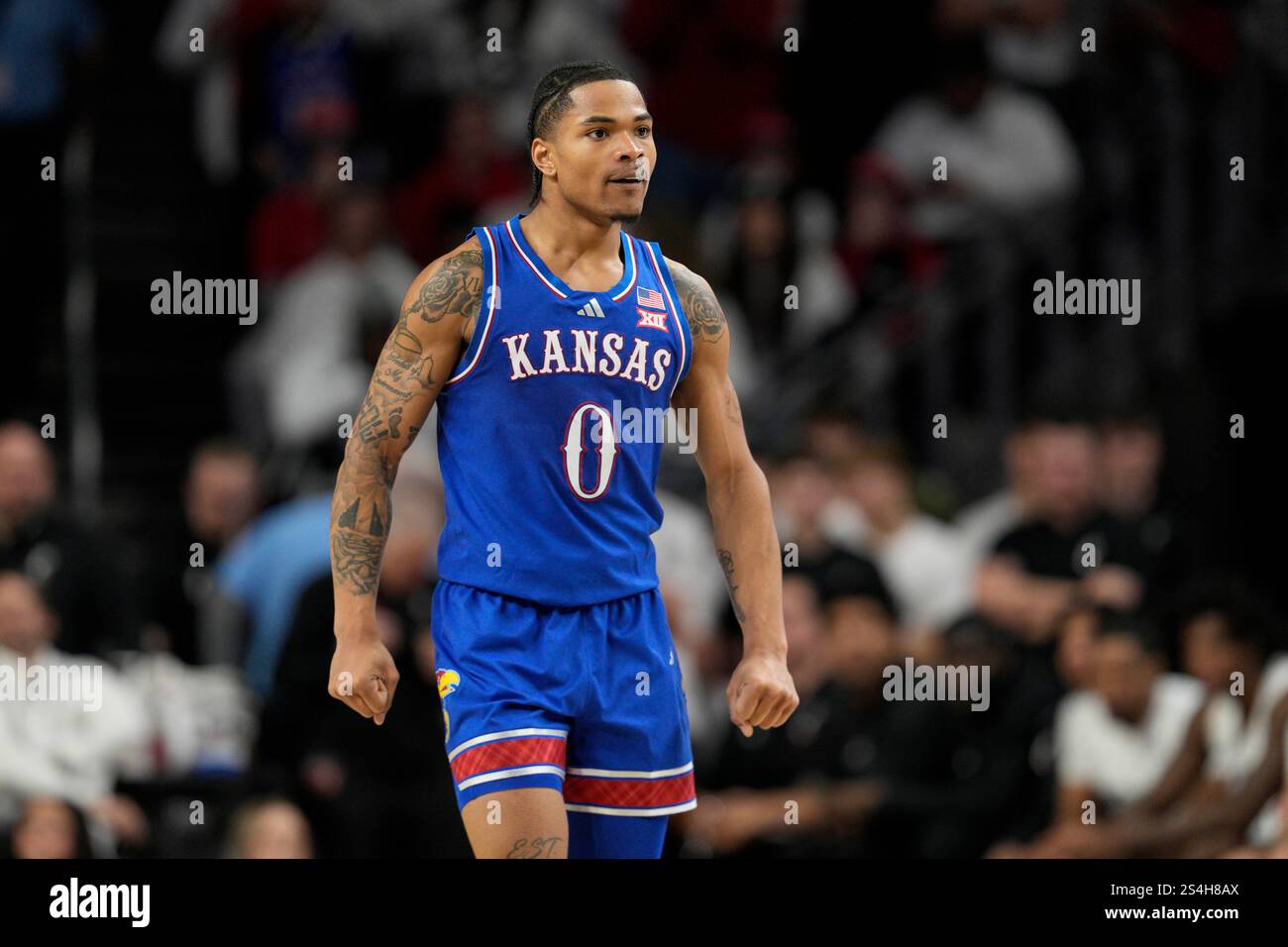 Kansas guard Shakeel Moore (0) reacts during an NCAA college basketball ...
