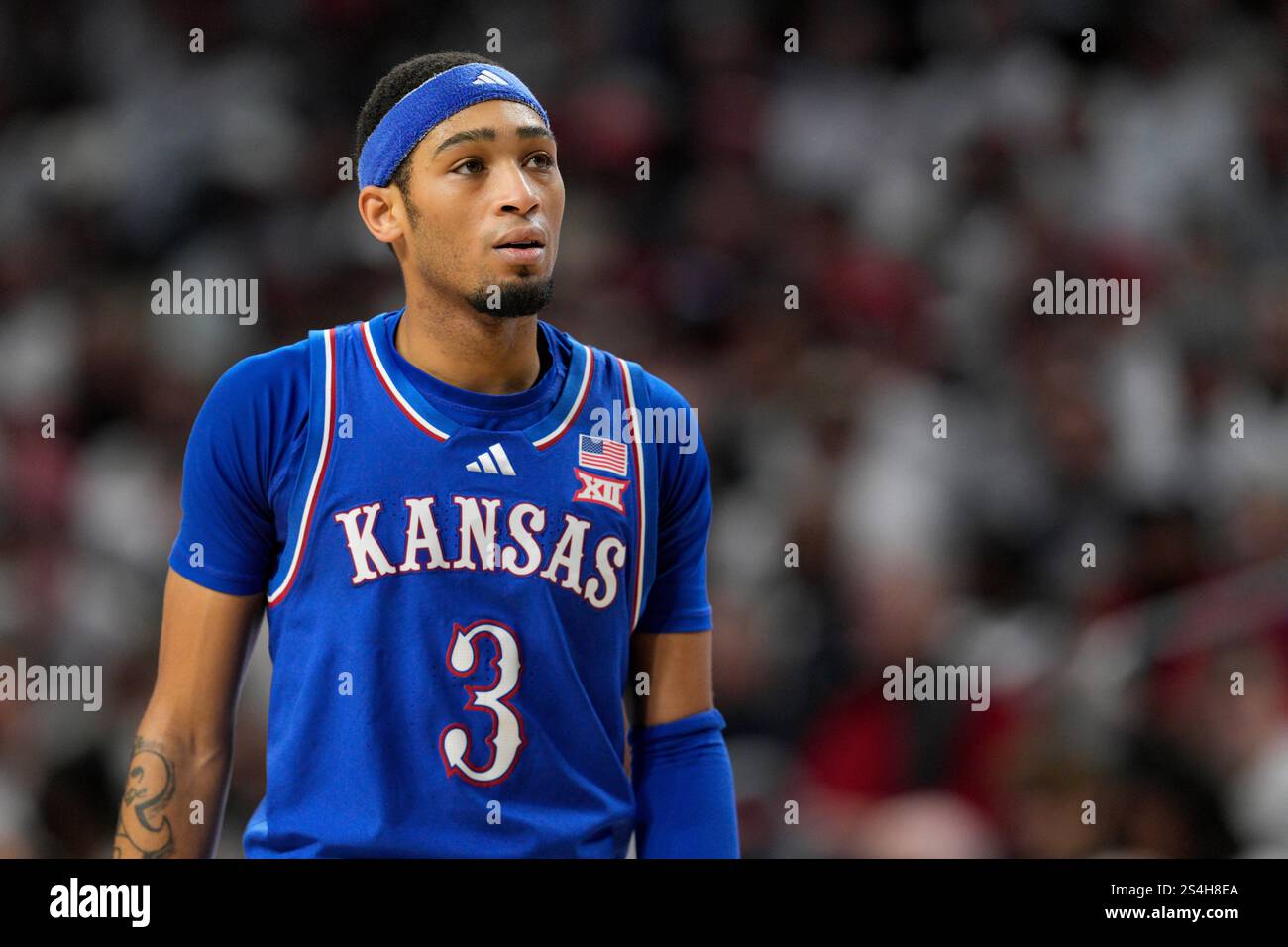 Kansas guard Dajuan Harris Jr. (3) plays during an NCAA college ...
