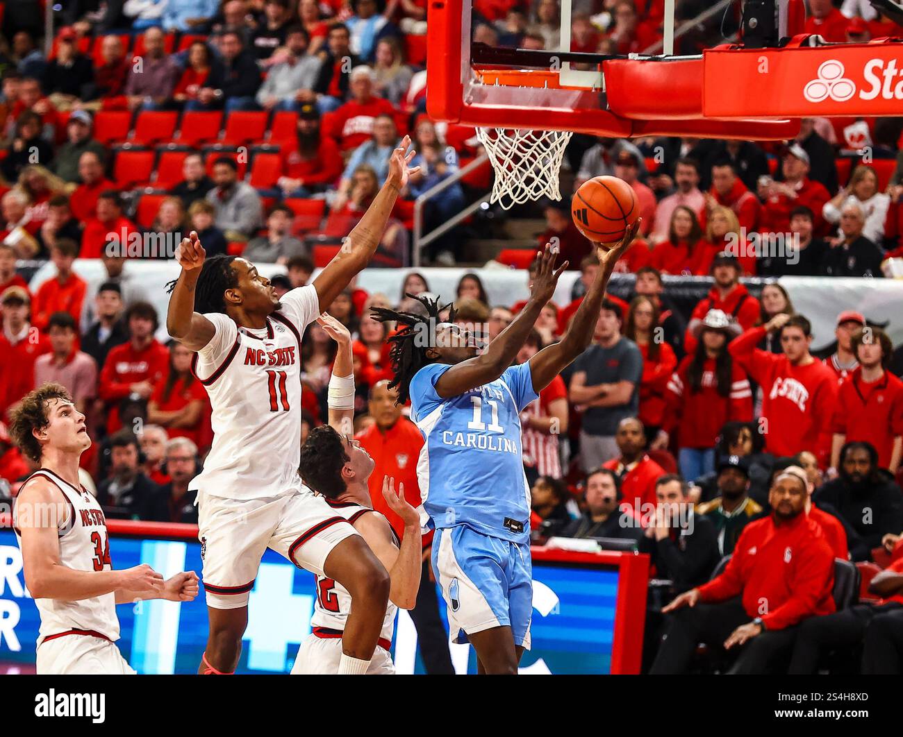 January 12, 2025: North Carolina freshman Ian Jackson (11) goes up for ...
