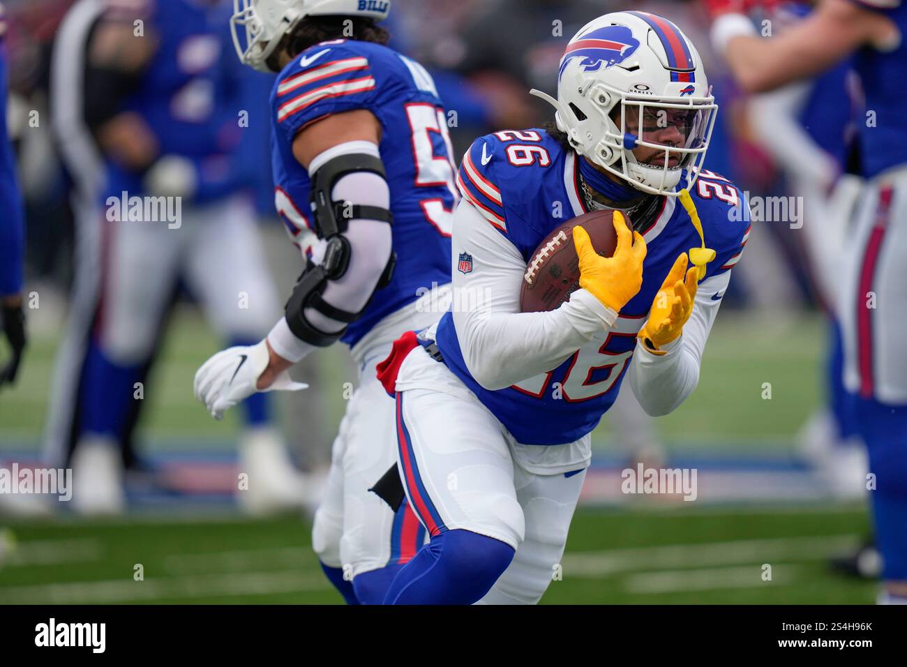 Buffalo Bills running back Ty Johnson (26) warms up before playing ...