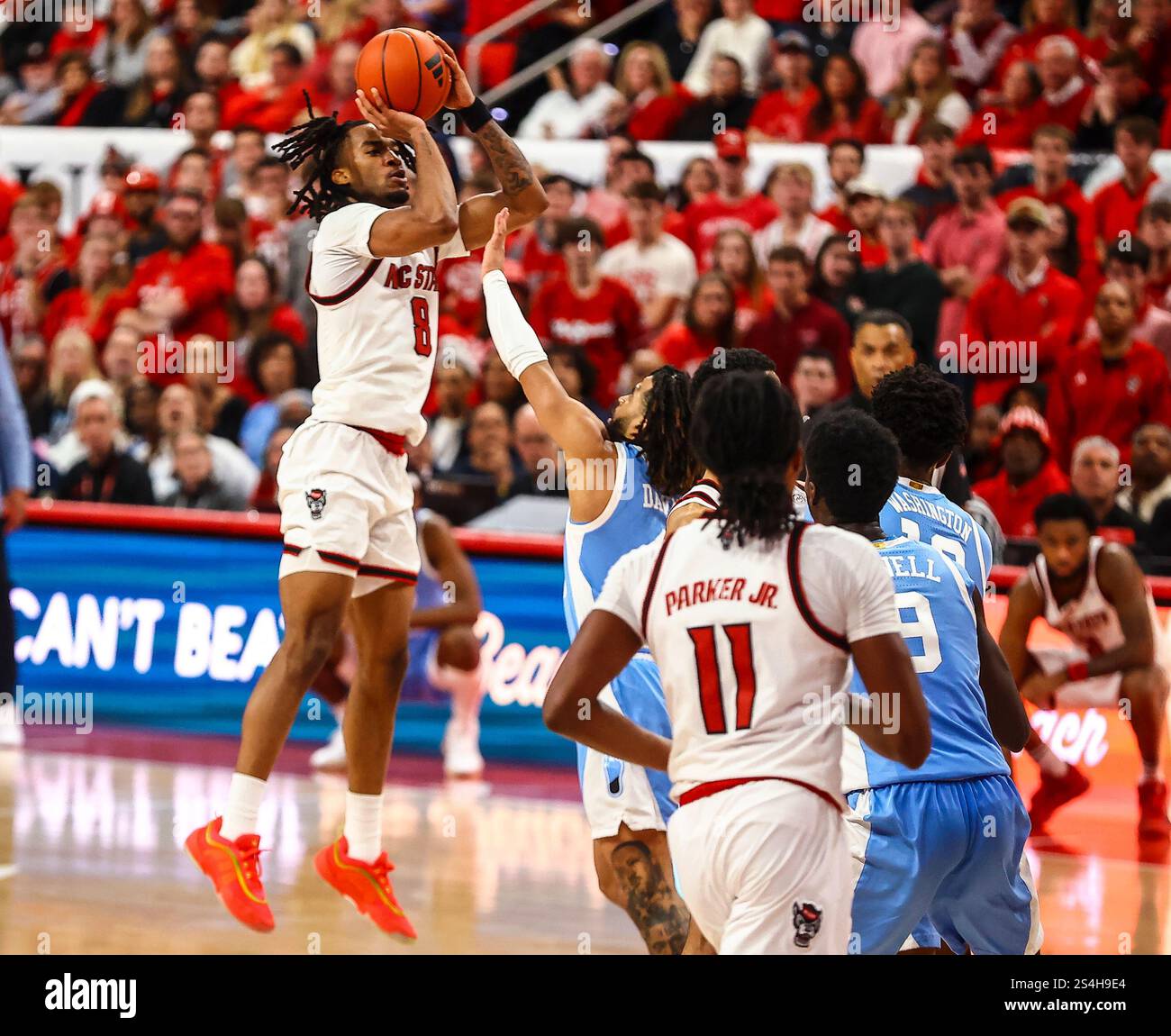 January 12, 2025: North Carolina State senior Jayden Taylor (8) shoots ...