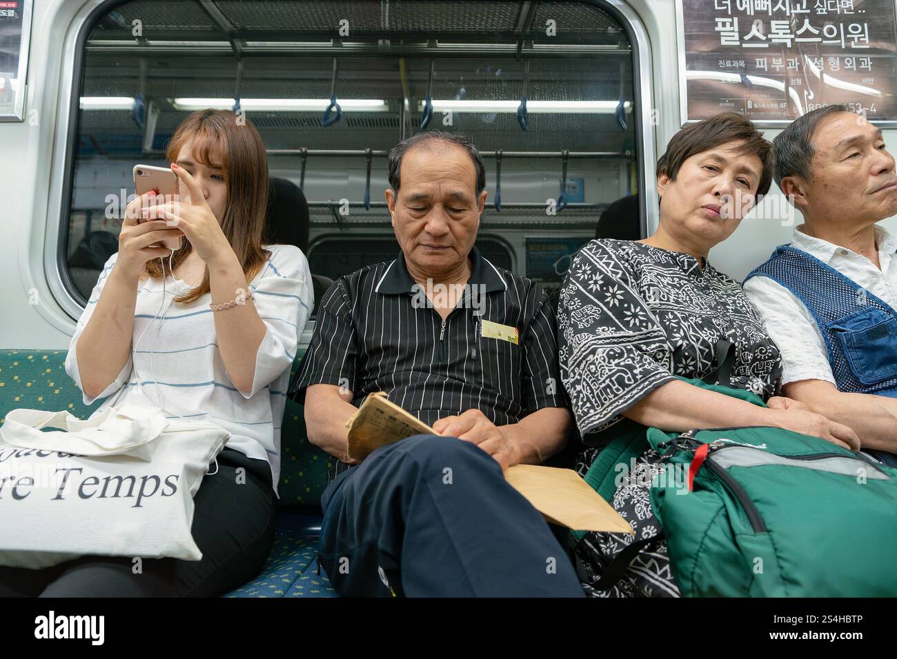 Busan, South Korea - May 25, 2017: passengers inside a train on Busan ...