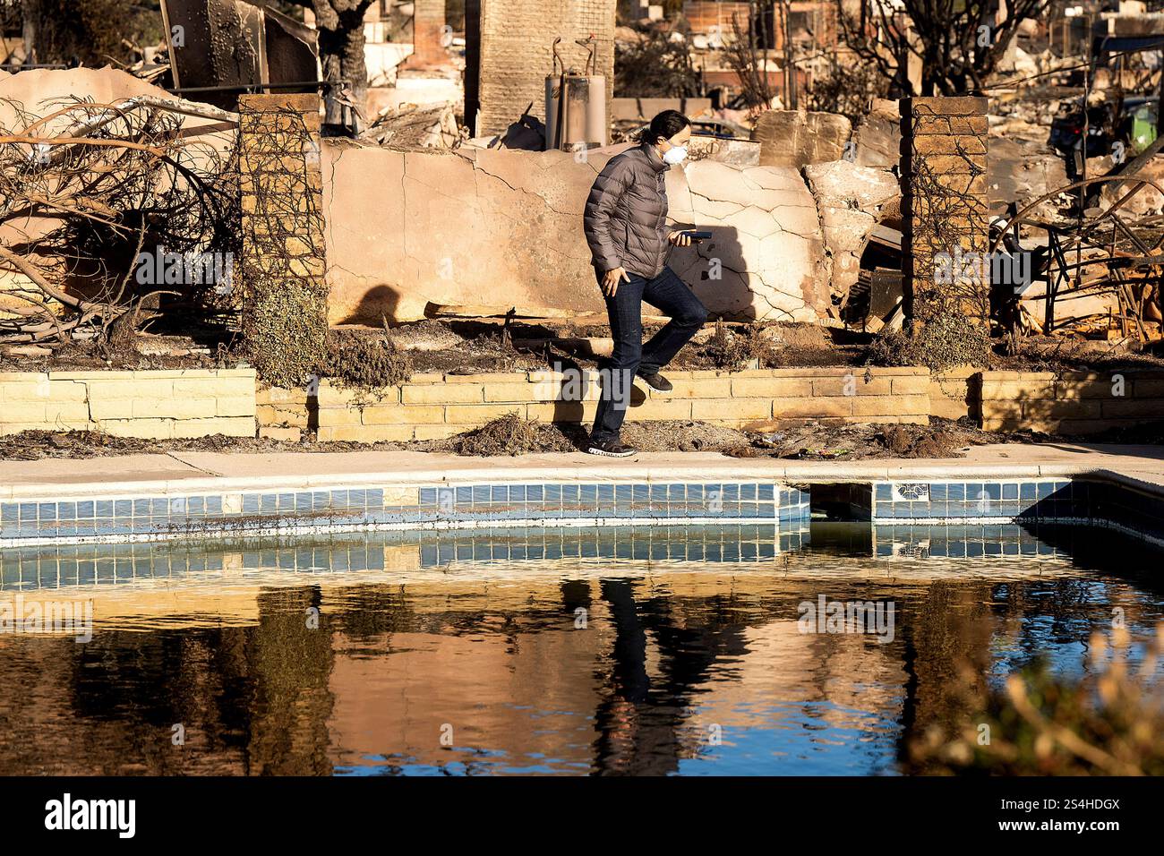Marjan Rajabi surveys damage at her Pacific Palisades home destroyed by ...