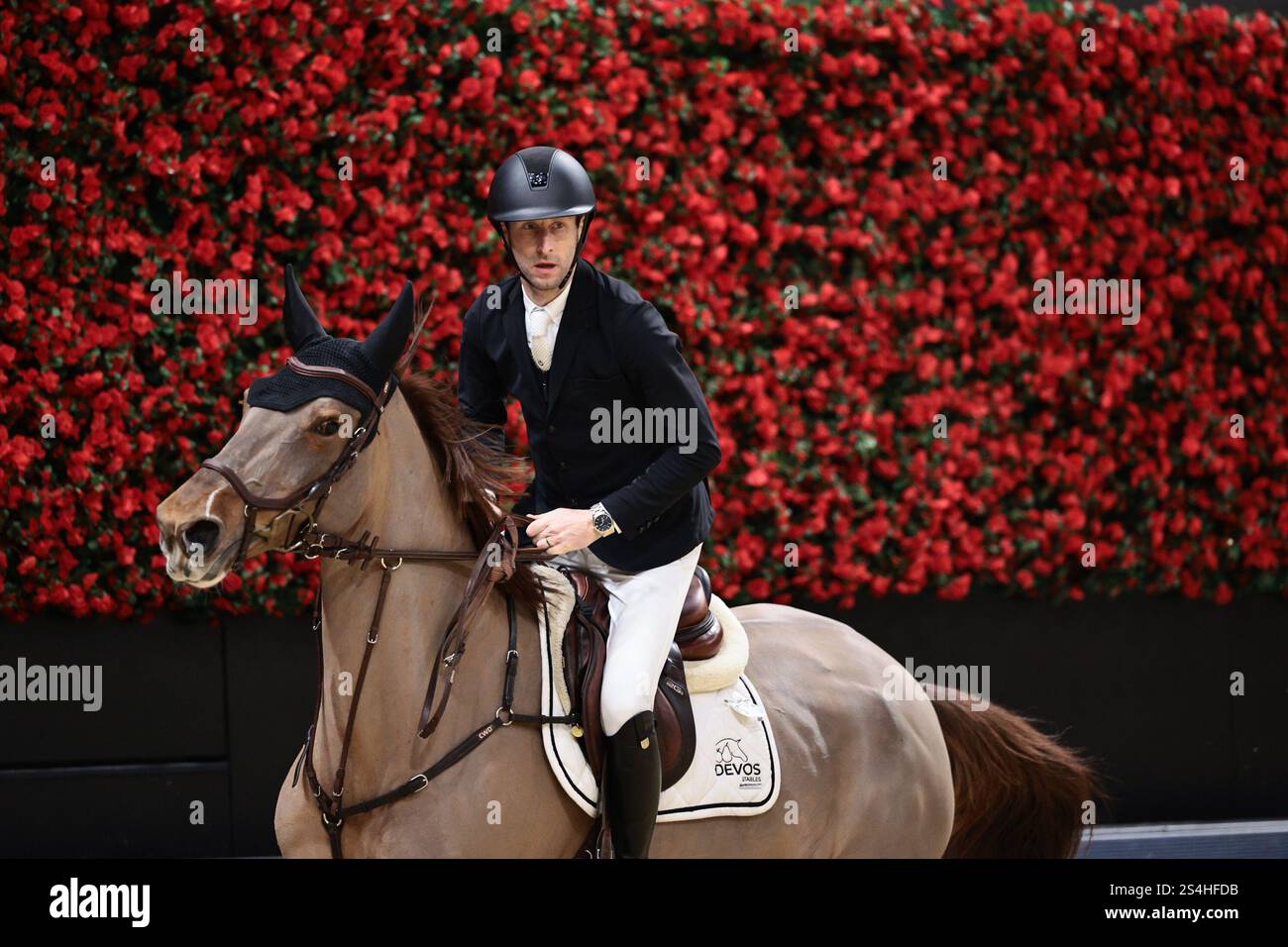 Basel, Switzerland. 12th Jan, 2025. Pieter Devos of Belgium with Toupie ...