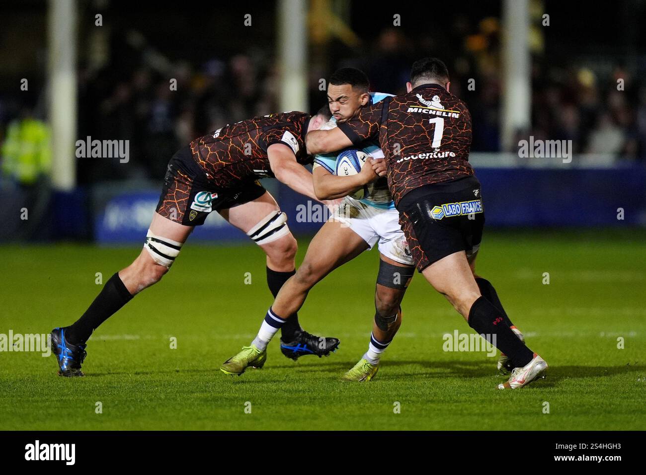 Clermont Auvergne's Giorgi Akhaladze (right) high tackles Bath's Max ...