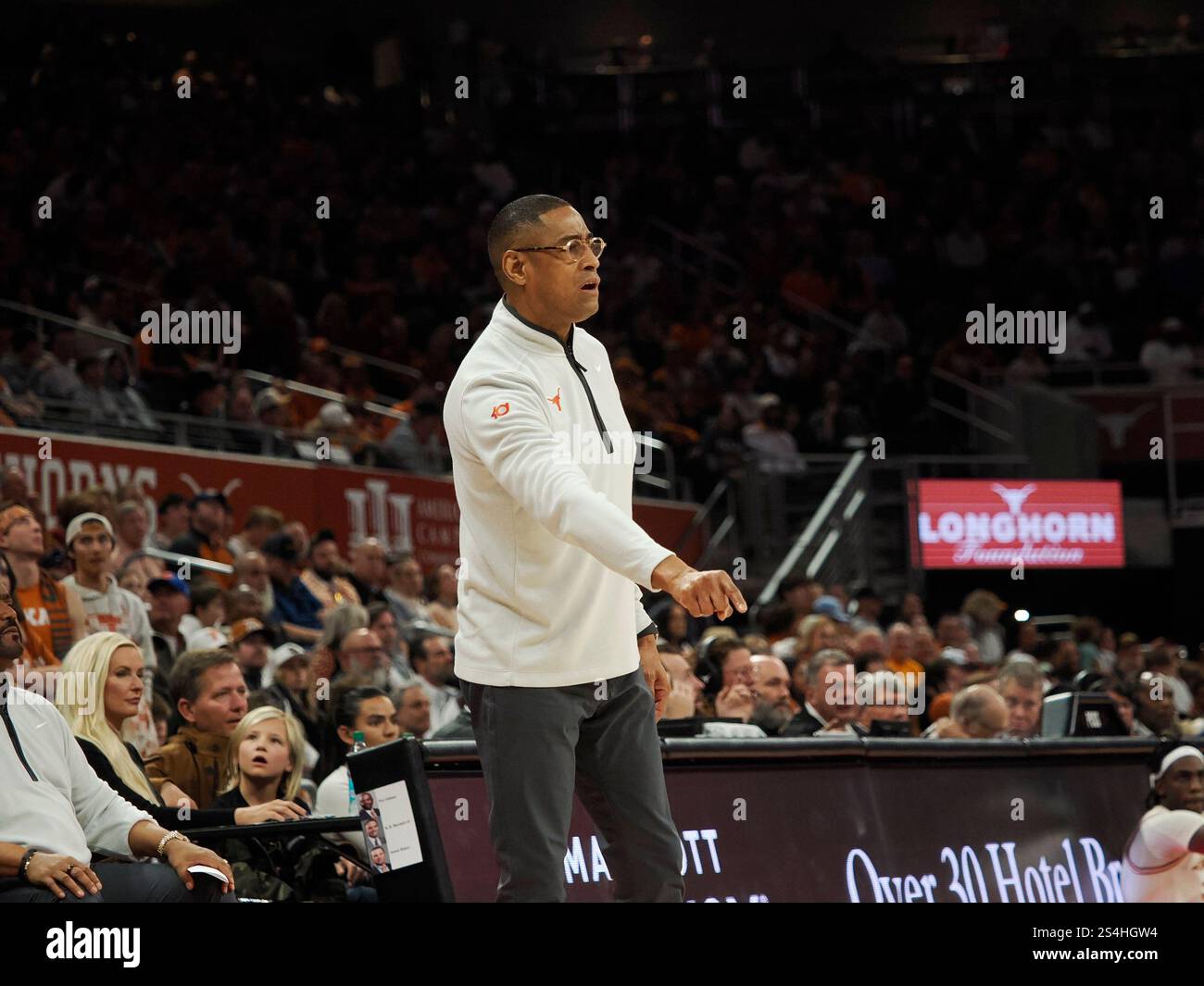 Texas head coach Rodney Terry directs his team during the second half ...