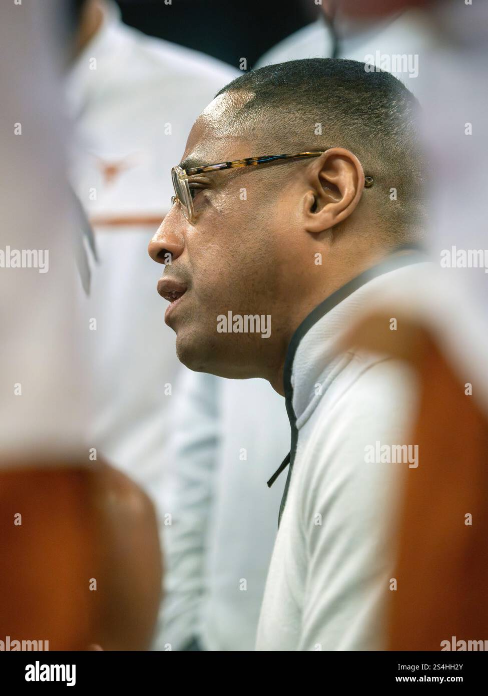Texas head coach Rodney Terry talks with his team during the second ...