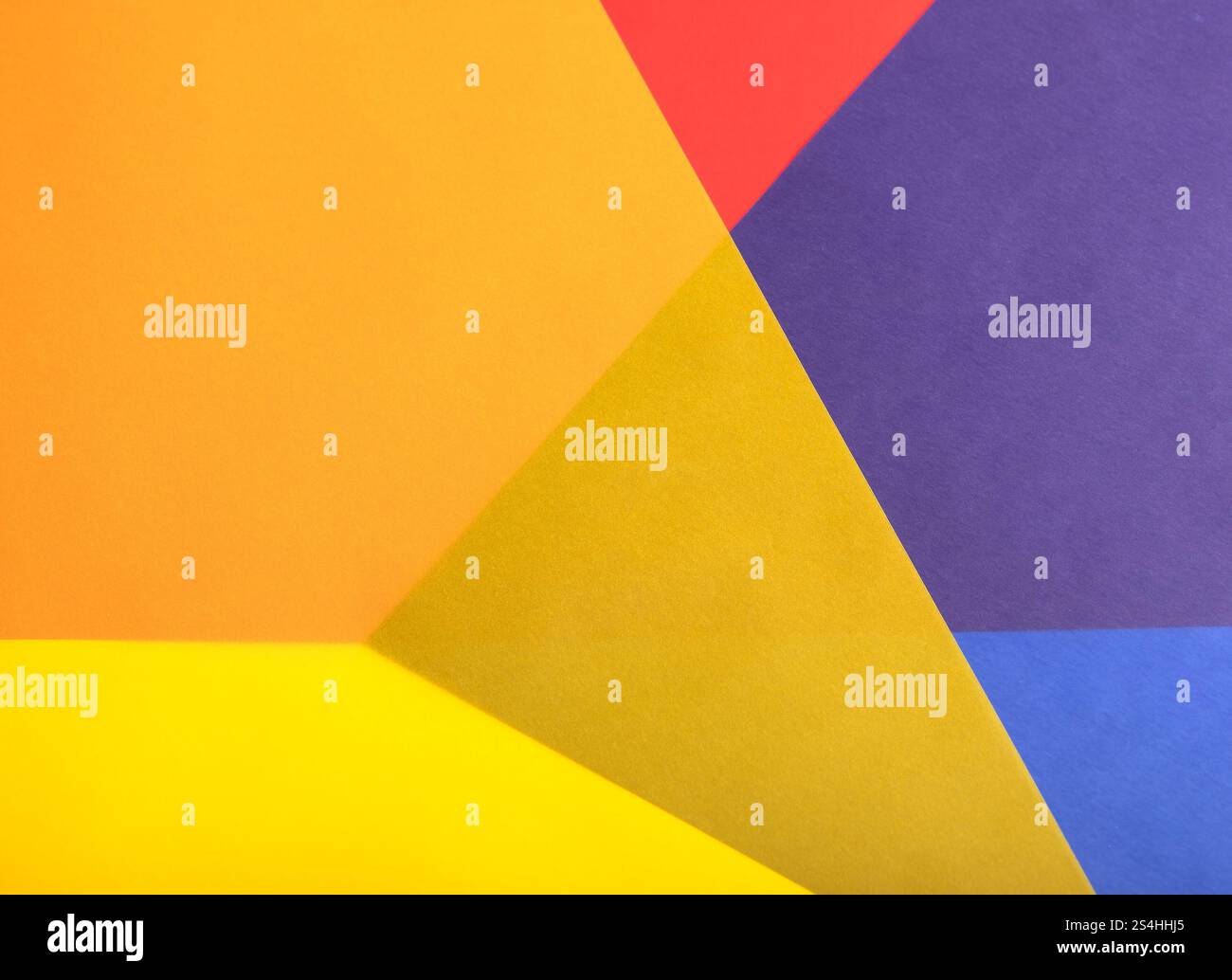 Colorful geometric paper background with translucent red, yellow ...