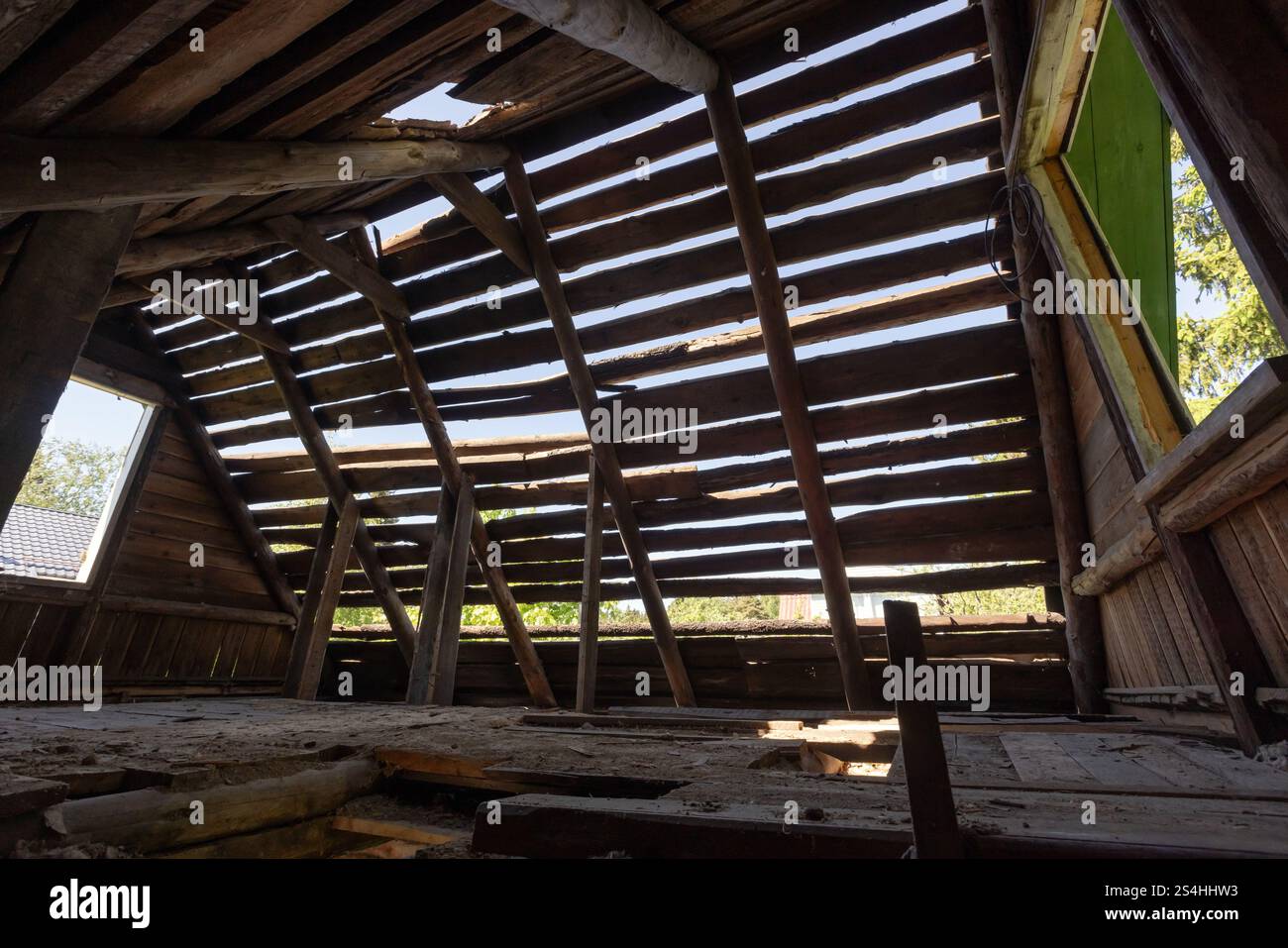 Abstract grunge wooden interior, abandoned attic room with broken roof ...