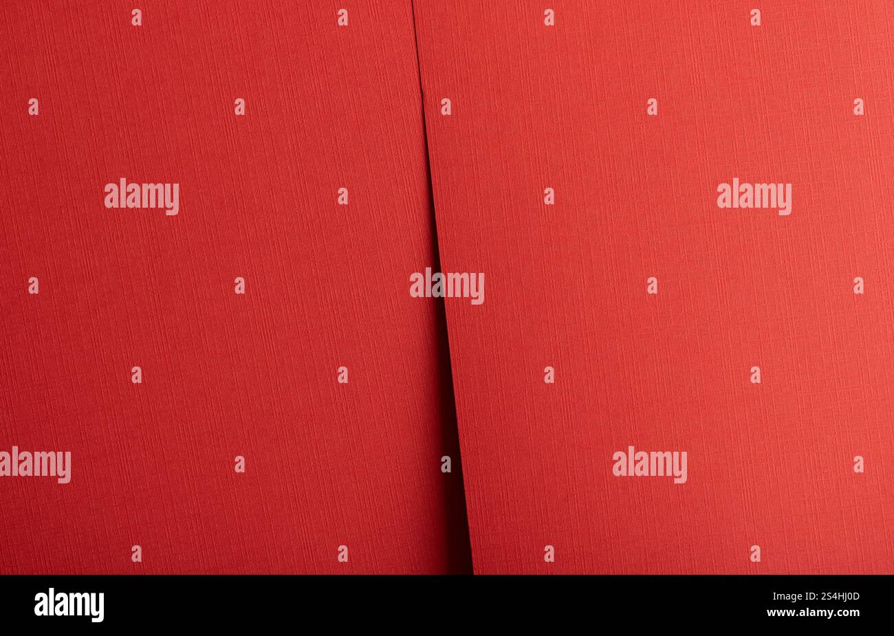 Fiery red paper background with warm tones and subtle overlapping fine ...