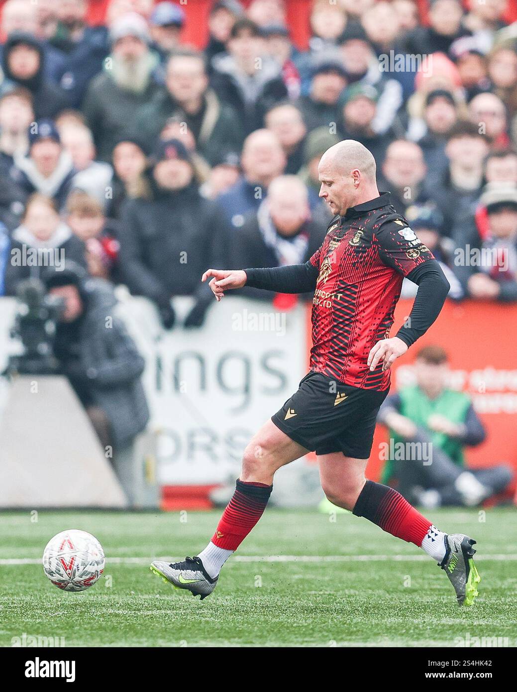 #4, Tom Tonks of Tamworth in action during the Emirates FA Cup Third ...