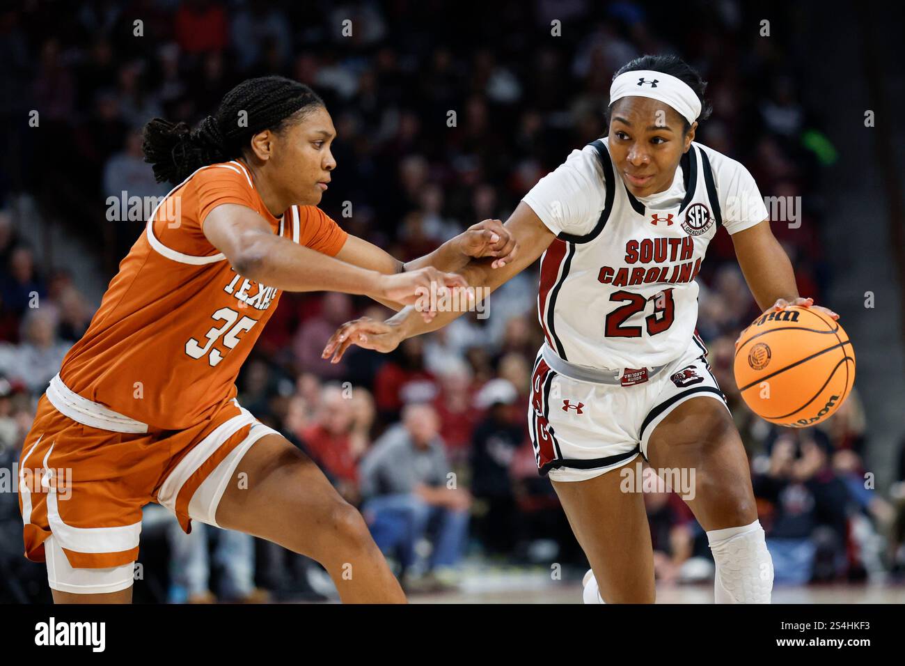 South Carolina guard Bree Hall (23) drives against Texas forward ...