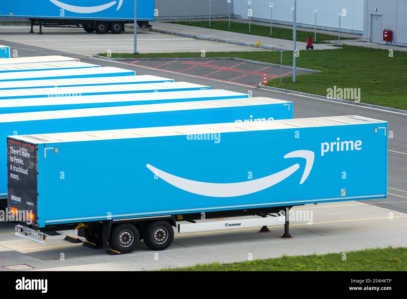 Gattendorf, Germany. 15th Oct, 2024. Amazon branded trailers are seen ...