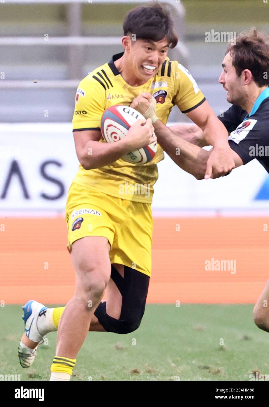 January 12, 2025, Tokyo, Japan - Tokyo Suntory Sungoliath full back Ryosuke Kawase carries the ...