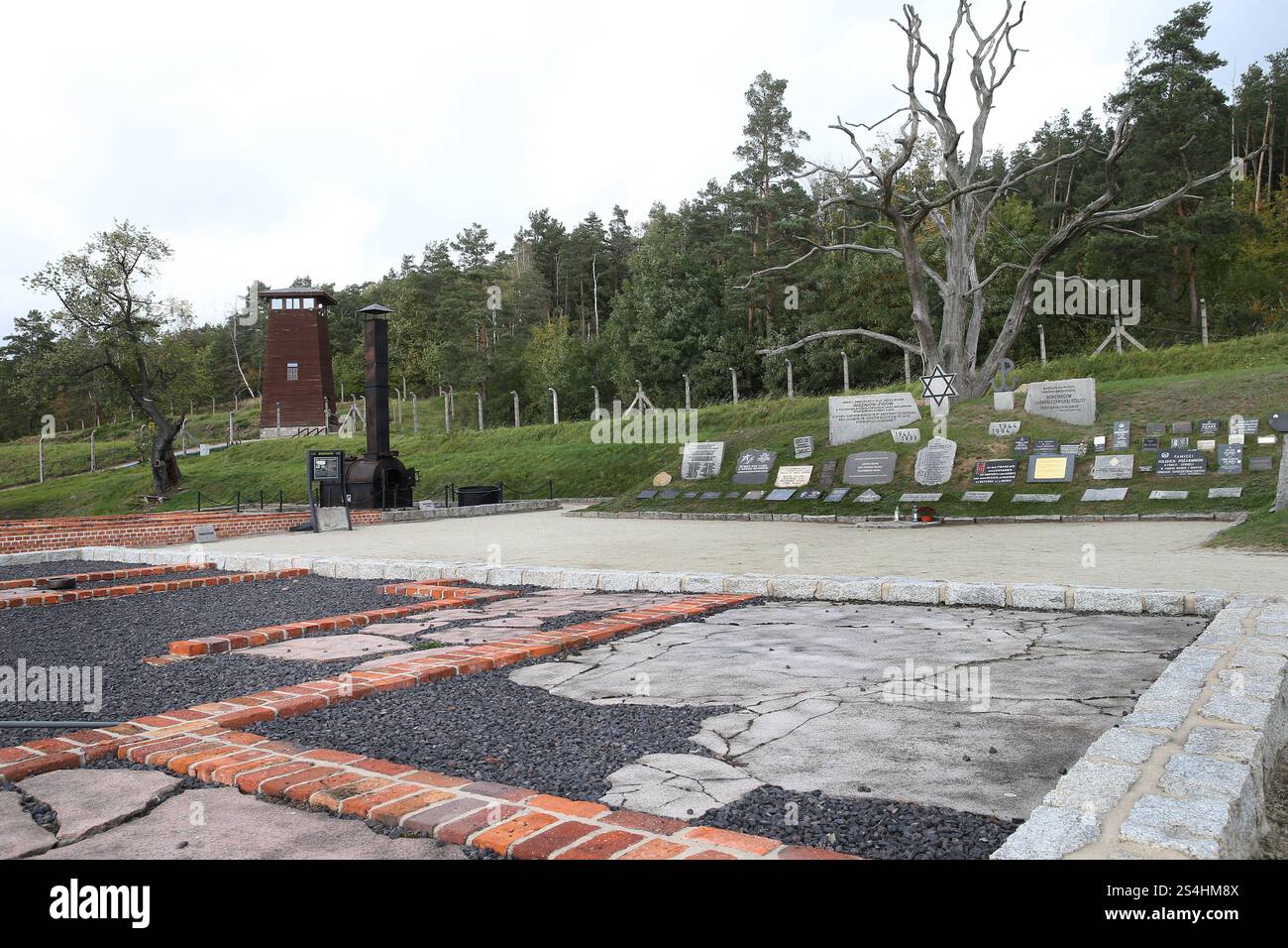View of the field crematorium, wooden watchtower and commemorative ...