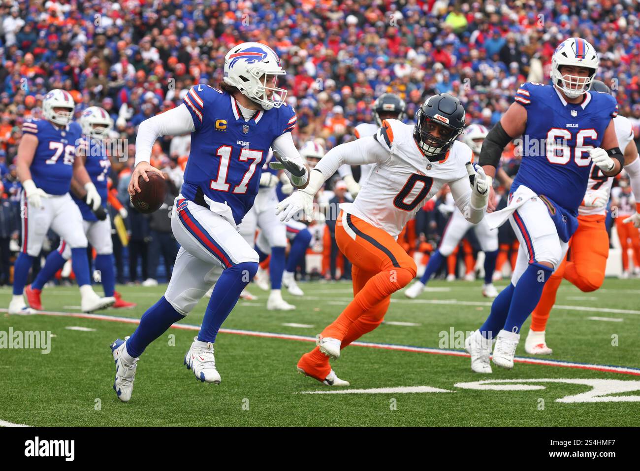 Buffalo Bills quarterback Josh Allen (17) carries the ball against the ...