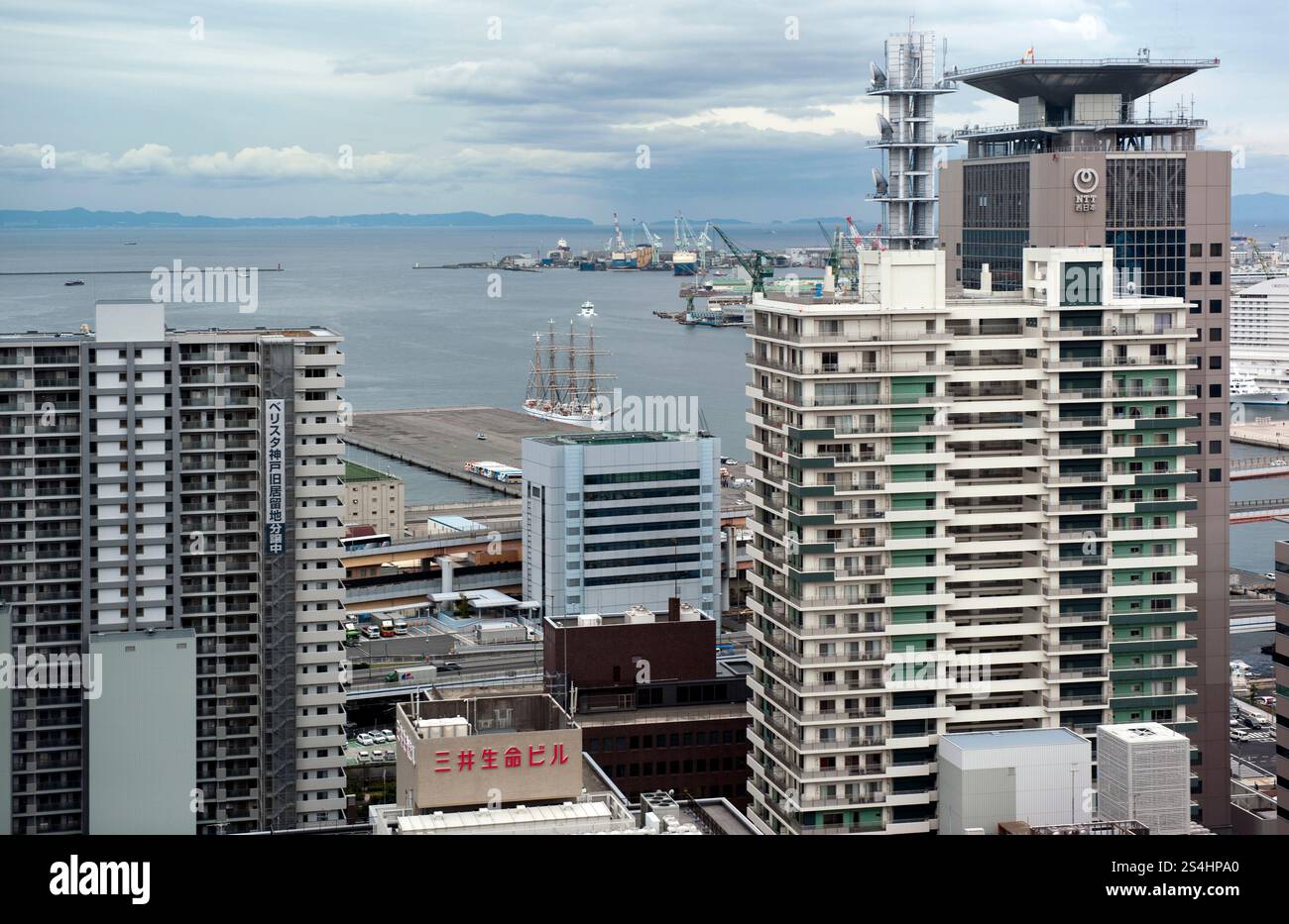 Downtown aerial view of port city of Kobe showing the city skyline ...