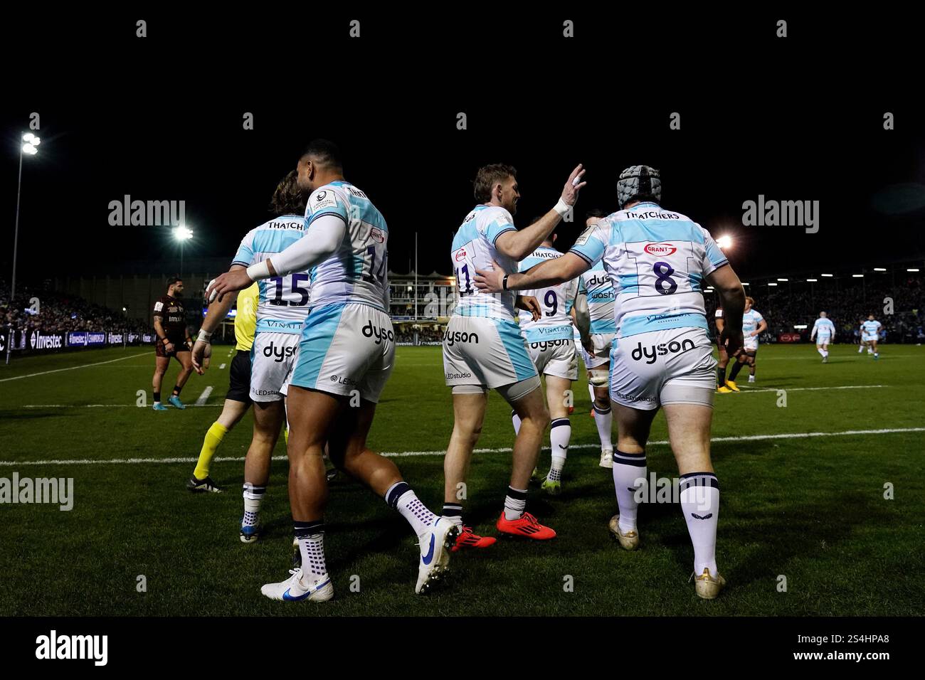 Bath players celebrate scoring their first try during the Investec ...