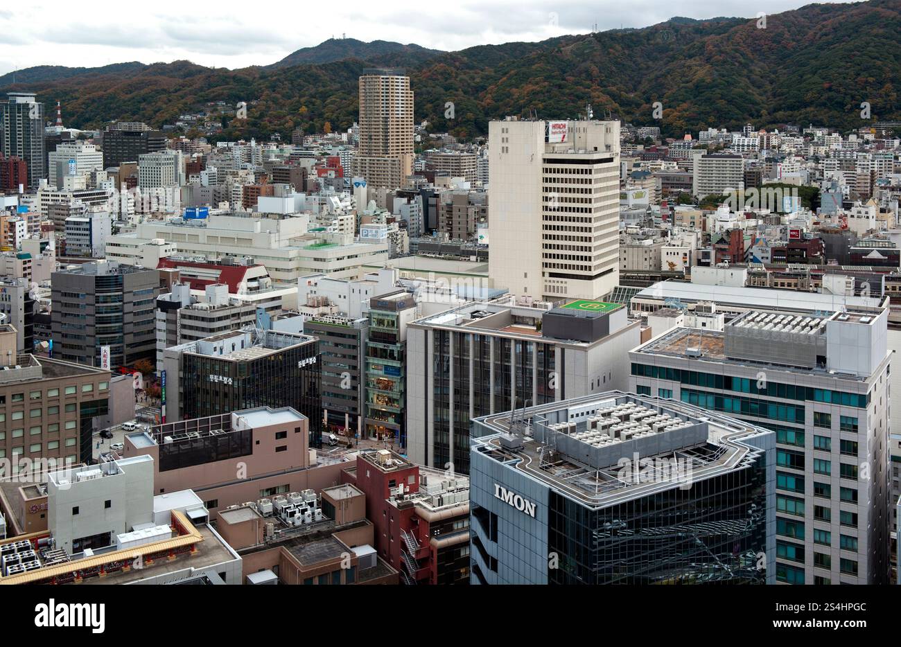 Downtown aerial view of port city of Kobe showing the city skyline ...