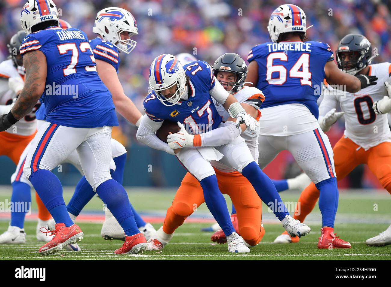 Denver Broncos defensive lineman Zach Allen, right, sacks Buffalo Bills ...