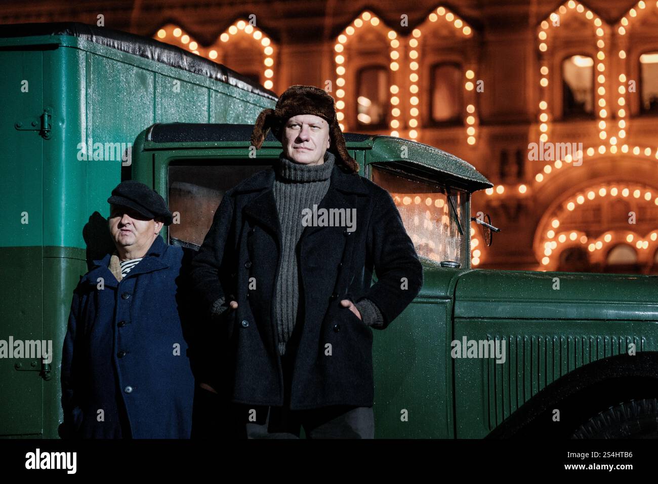 MOSCOW, RUSSIA - NOVEMBER 06 2023: Two men standing next to a vintage ...
