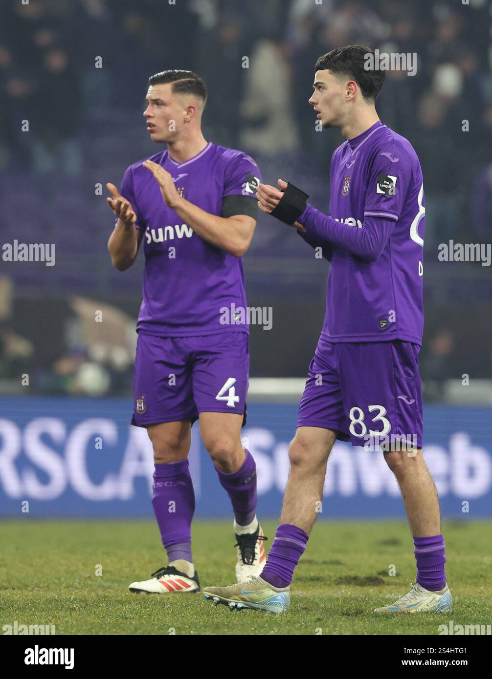 Brussels, Belgium. 12th Jan, 2025. Anderlecht's Jan-Carlo Simic and Anderlecht's Tristan Degreef ...