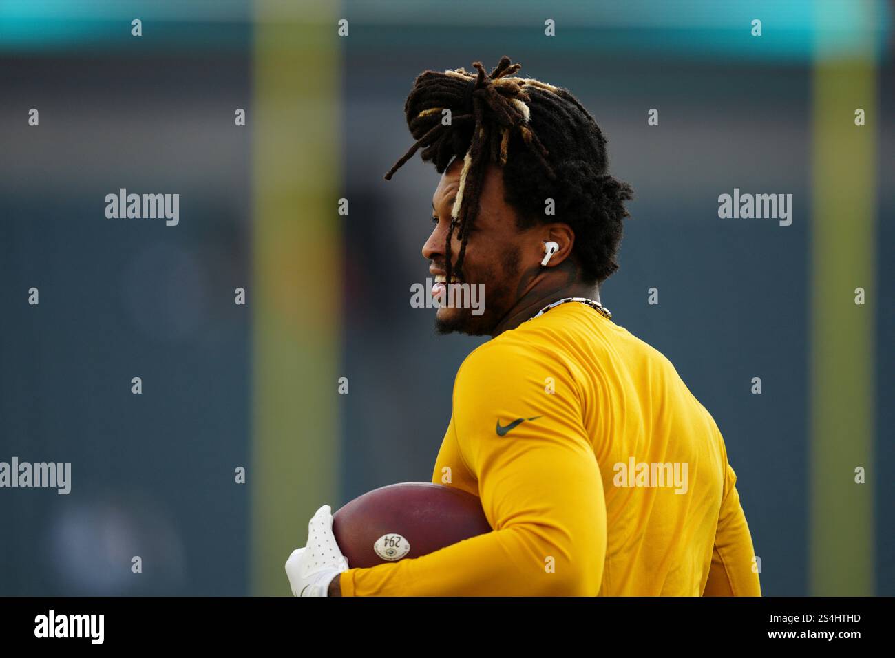 Green Bay Packers safety Xavier McKinney (29) walks the field before an ...