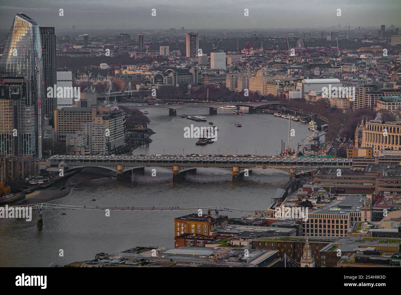 An aerial view across the River Thames in London: One Blackfriars and Blackfriar's Bridge in the ...