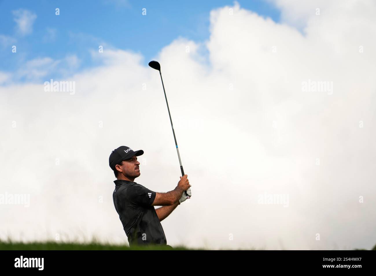 Nick Taylor, of Canada, hits on the second hole during the final round ...