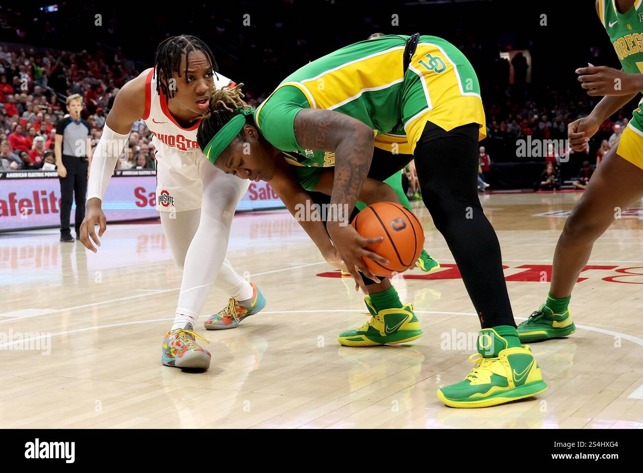 Ohio State forward Ajae Petty (1) and Oregon center Phillipina Kyei (15 ...