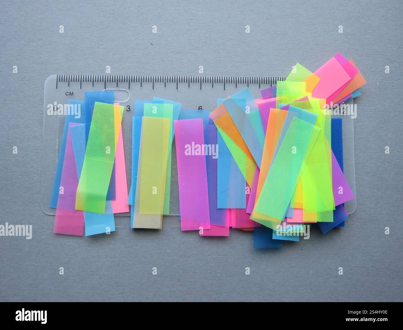 Colorful Pile Of Sticky Markers Stock Photo - Alamy