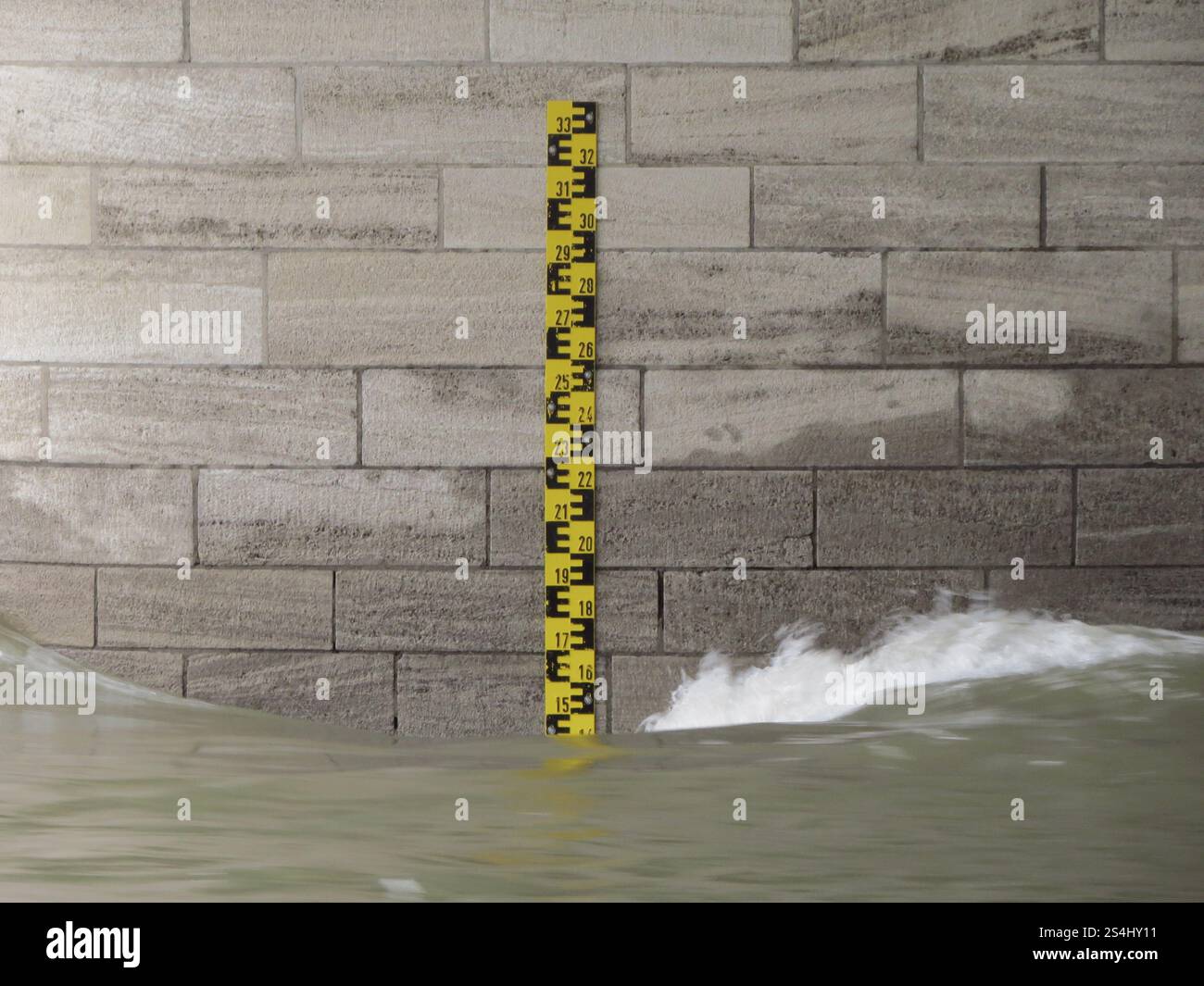 Flood With Water Level Meter Stock Photo - Alamy