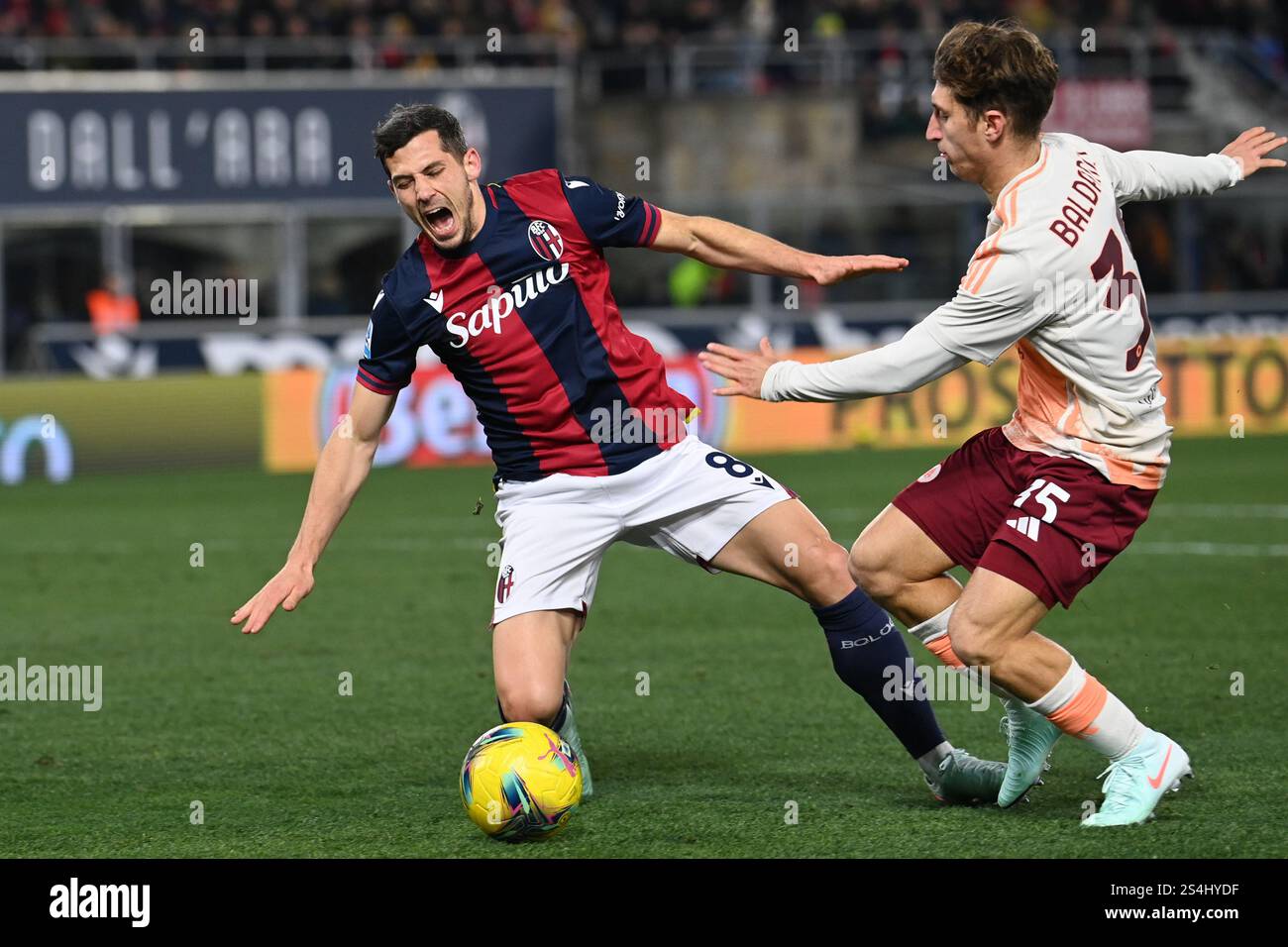Bologna, Italy. 12th Jan, 2025. Remo Freuler (Bologna Fc) and Tommaso ...