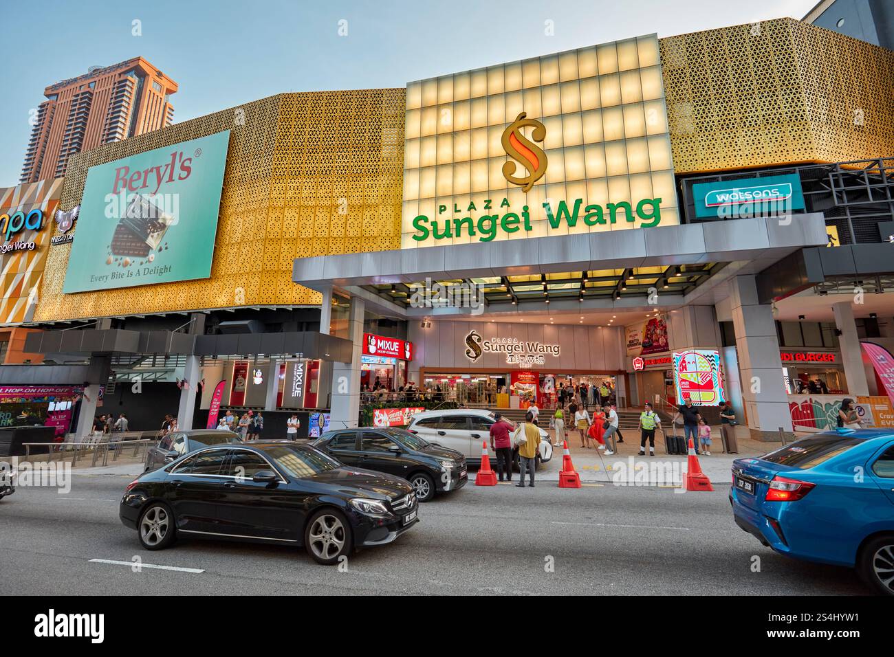Cars pass by the Sungei Wang Plaza, a popular shopping mall on Jalan ...
