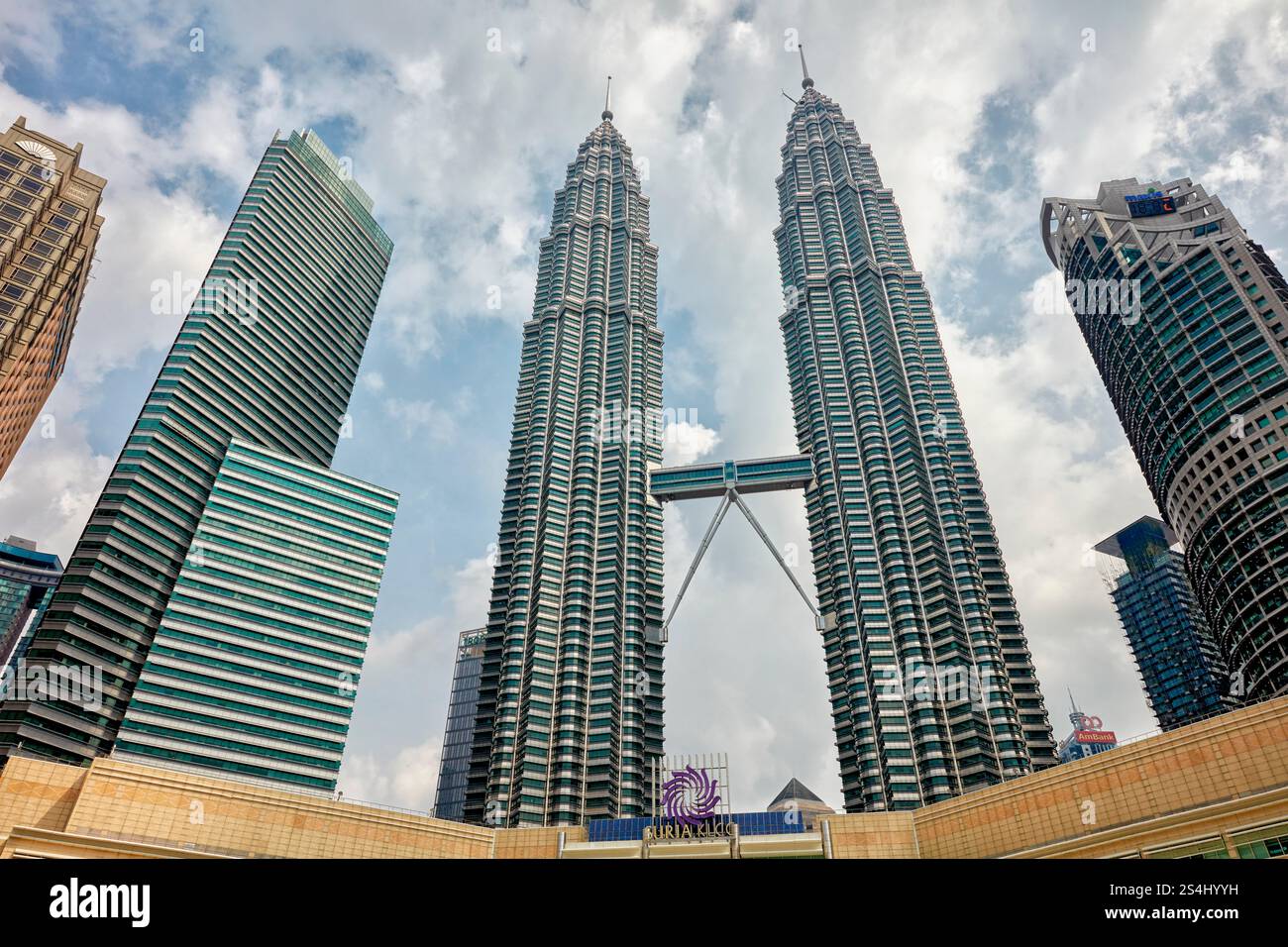 View from below of the Petronas Twin Towers, iconic skyscrapers in the ...
