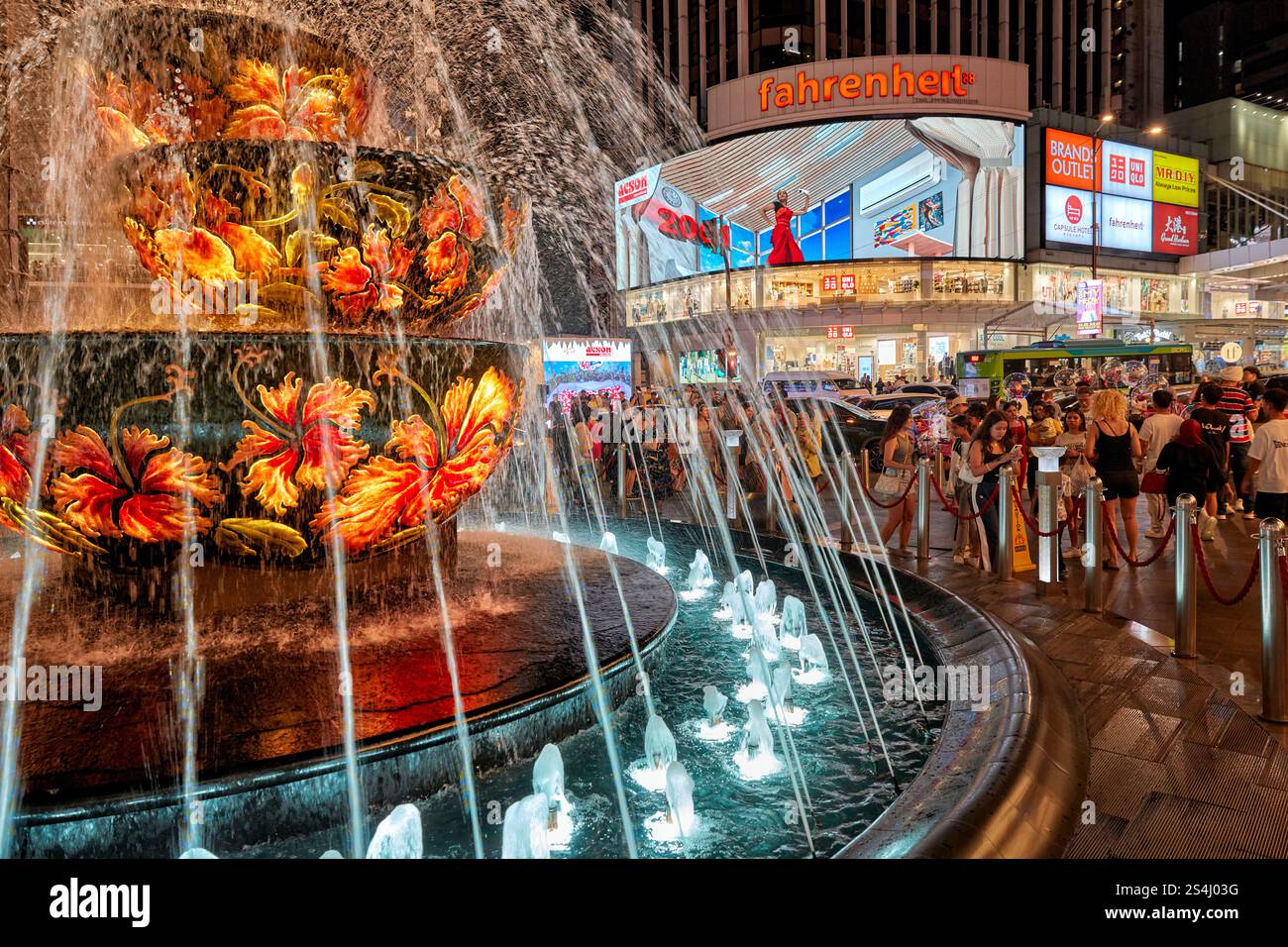 Colorful illuminated water fountain in front of The Pavilion, a luxury ...