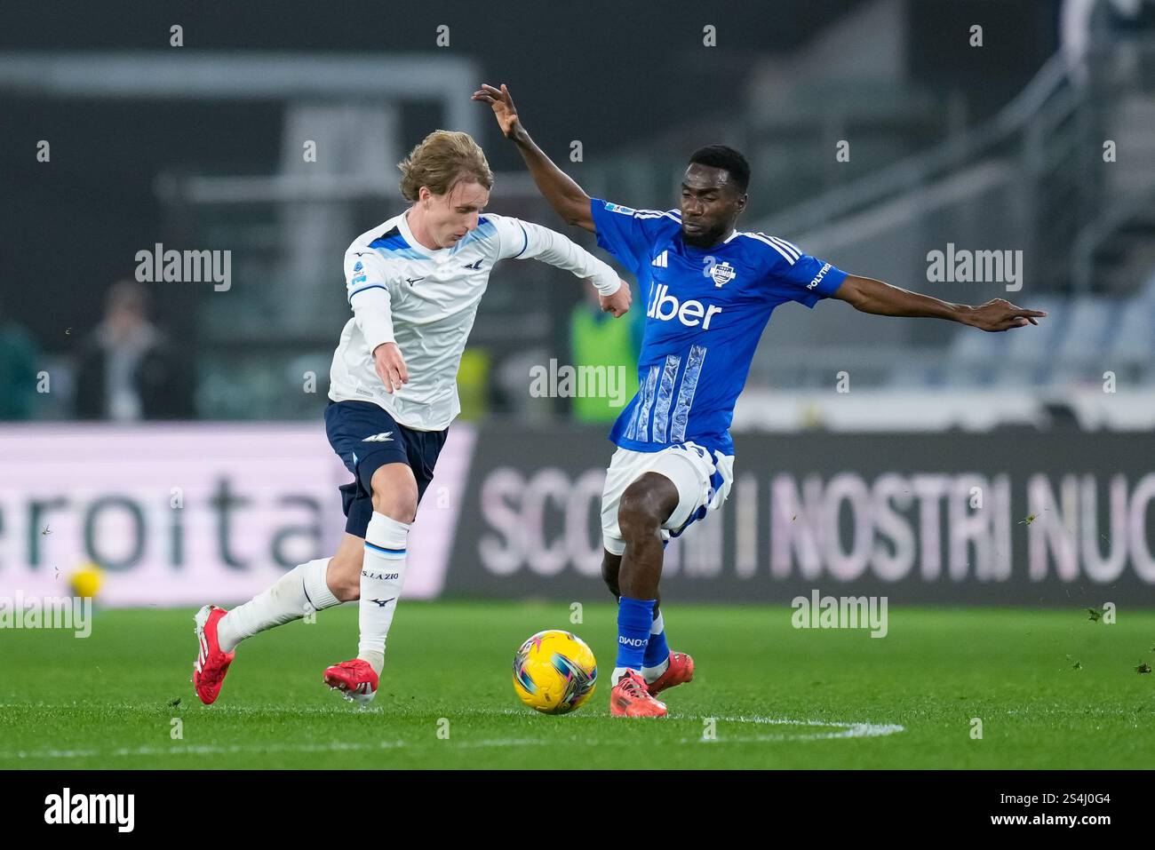 Rome, Italy. 10th Jan, 2025. Nicolo' Rovella of SS Lazio and Alieu Fadera of Como 1907 compete ...