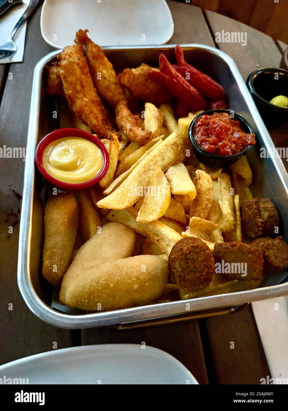 assorted beer snacks, chicken nuggets, french fries, shrimps temputa ...