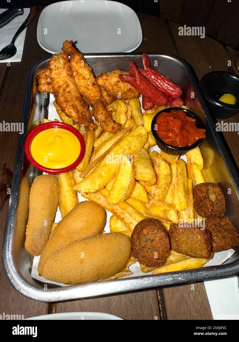 assorted beer snacks, chicken nuggets, french fries, shrimps temputa ...