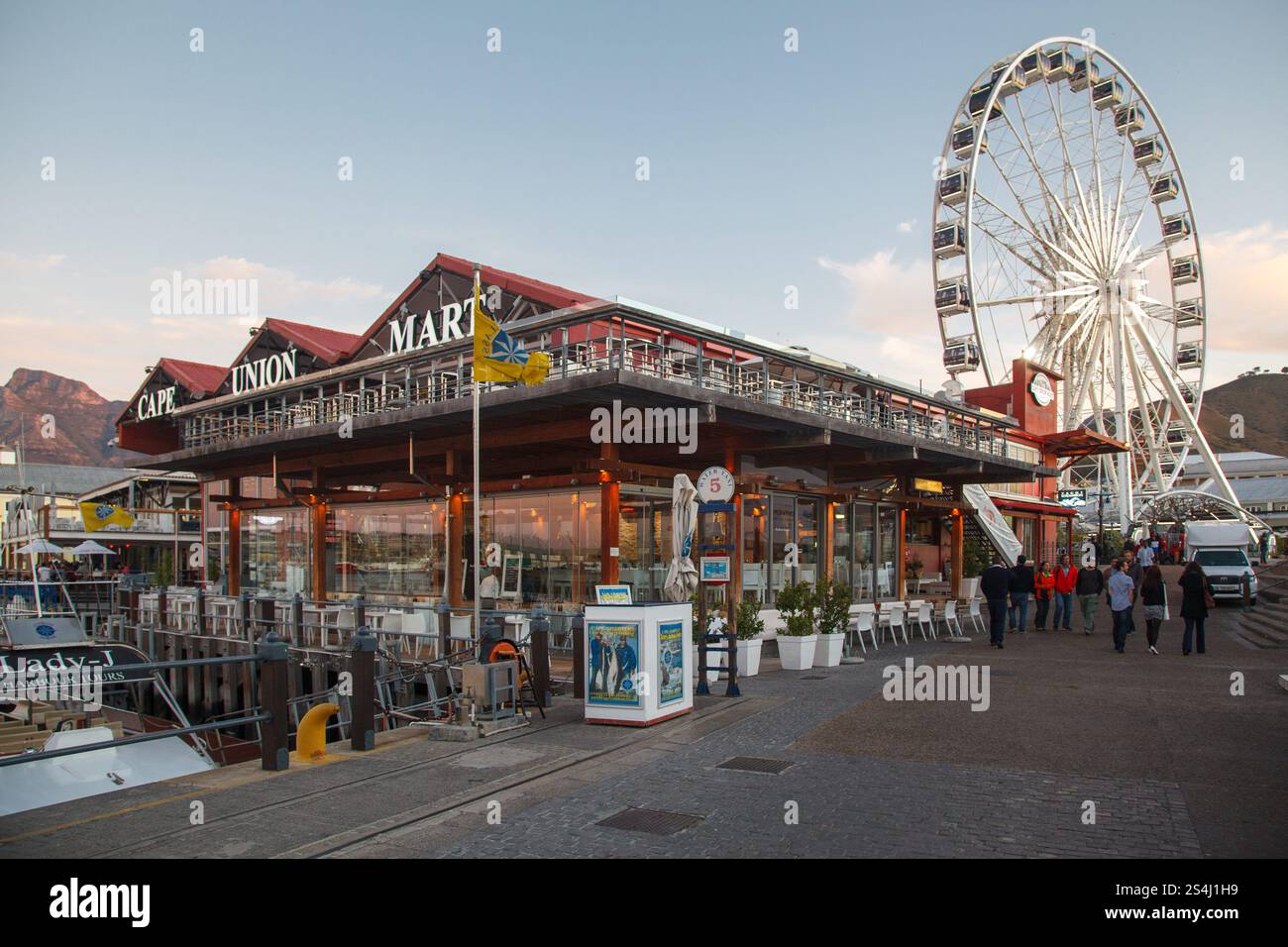 A Restaurant and the Ferris Wheel in Victoria and Albert waterfront ...
