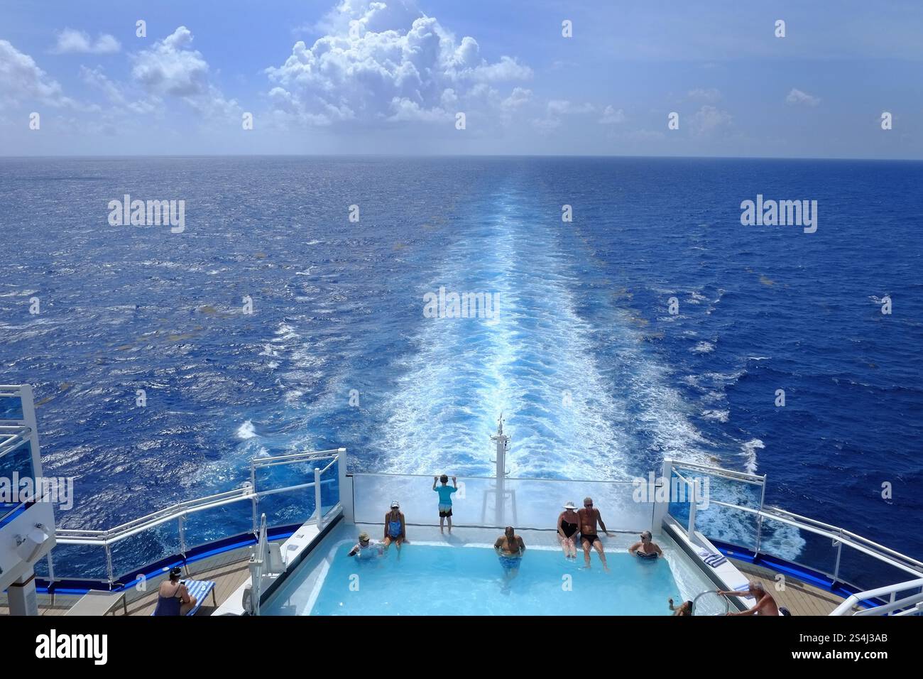 Children and adults in the wake view pool of a cruise ship in the ...