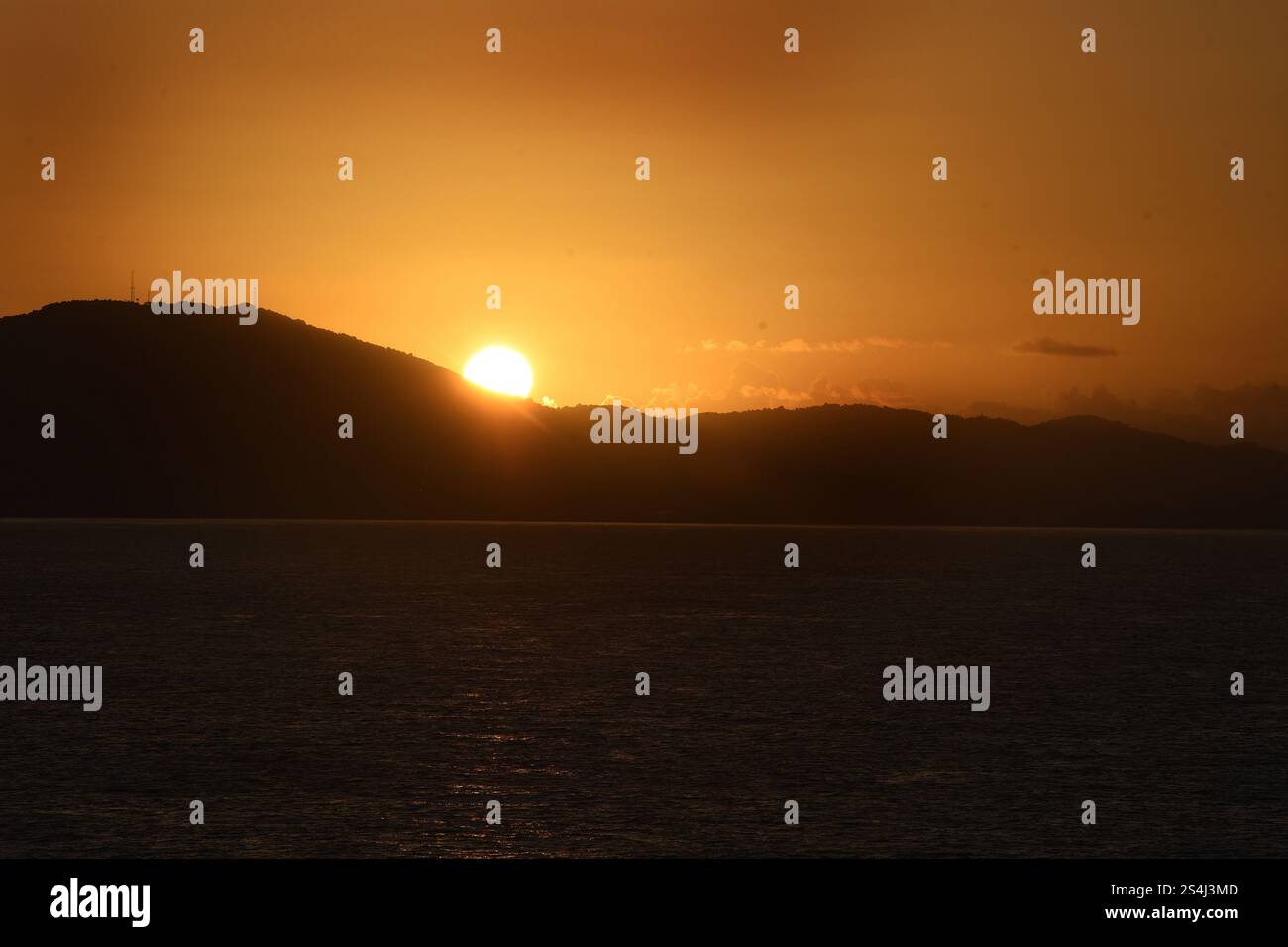 The sun rises over St. Thomas in the U.S. Virgin Islands Stock Photo ...